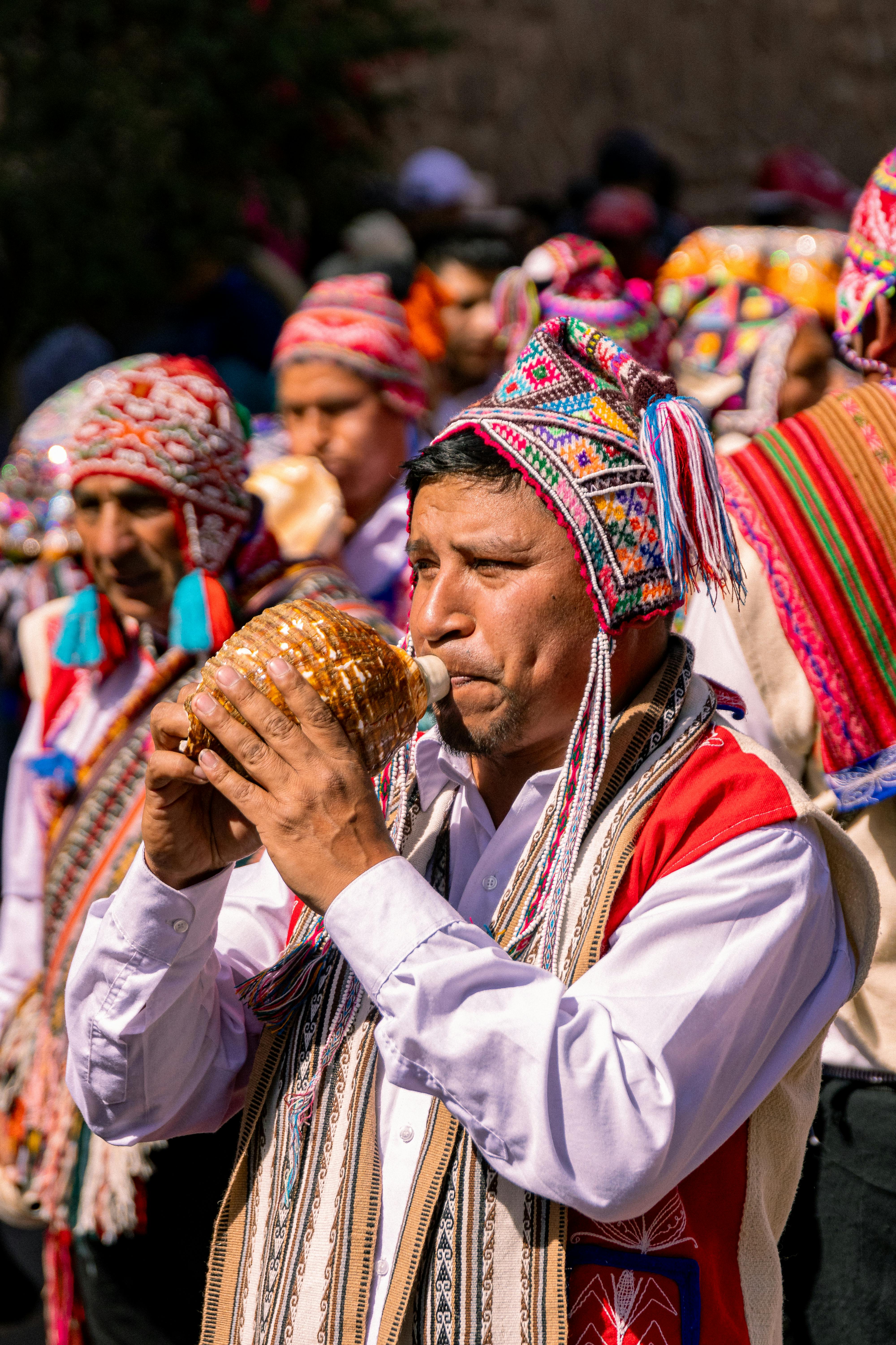 Man in Traditional Clothing Playing Traditional Musical Instrument at ...