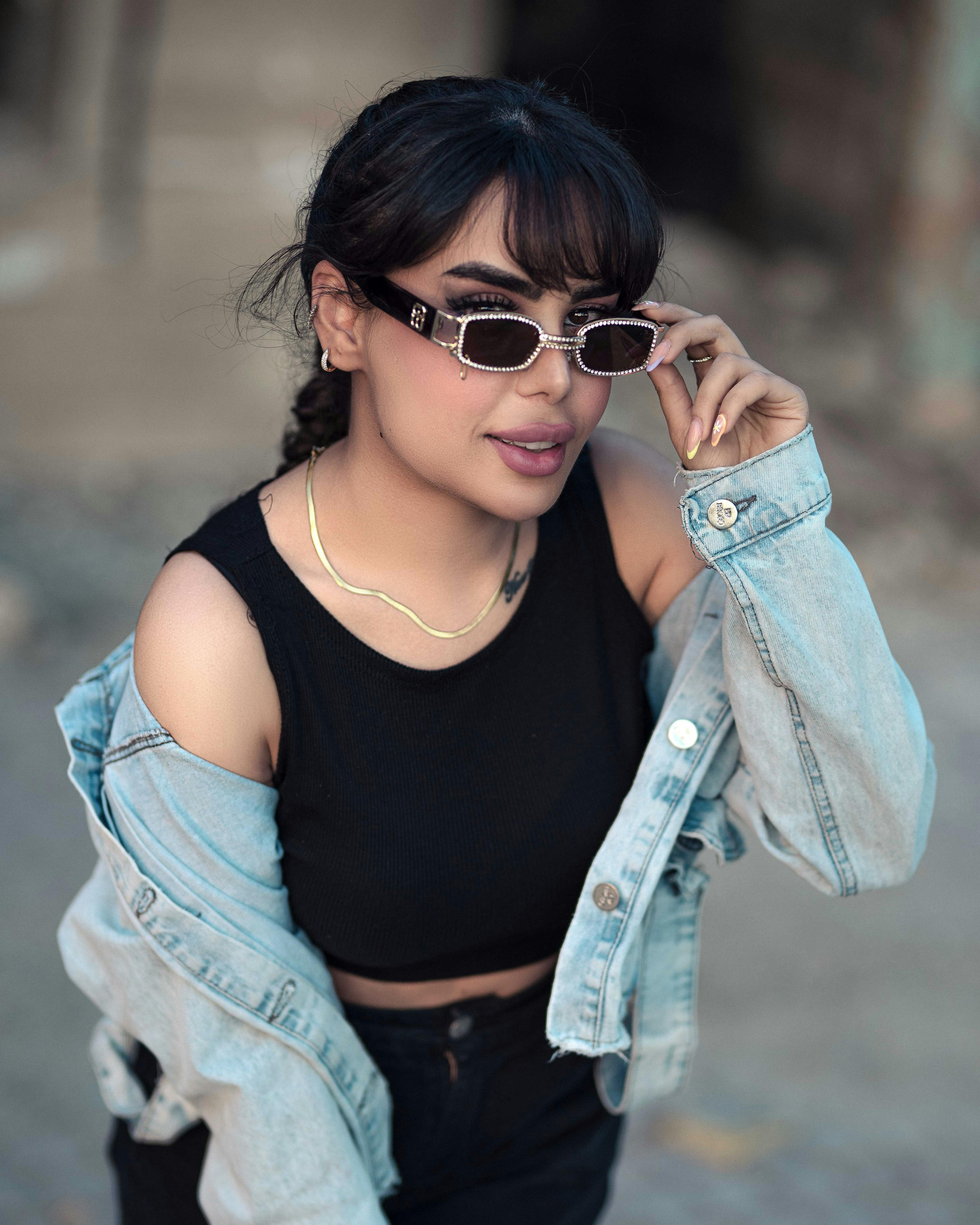 Photo of a Standing Woman Looking at Her Left · Free Stock Photo