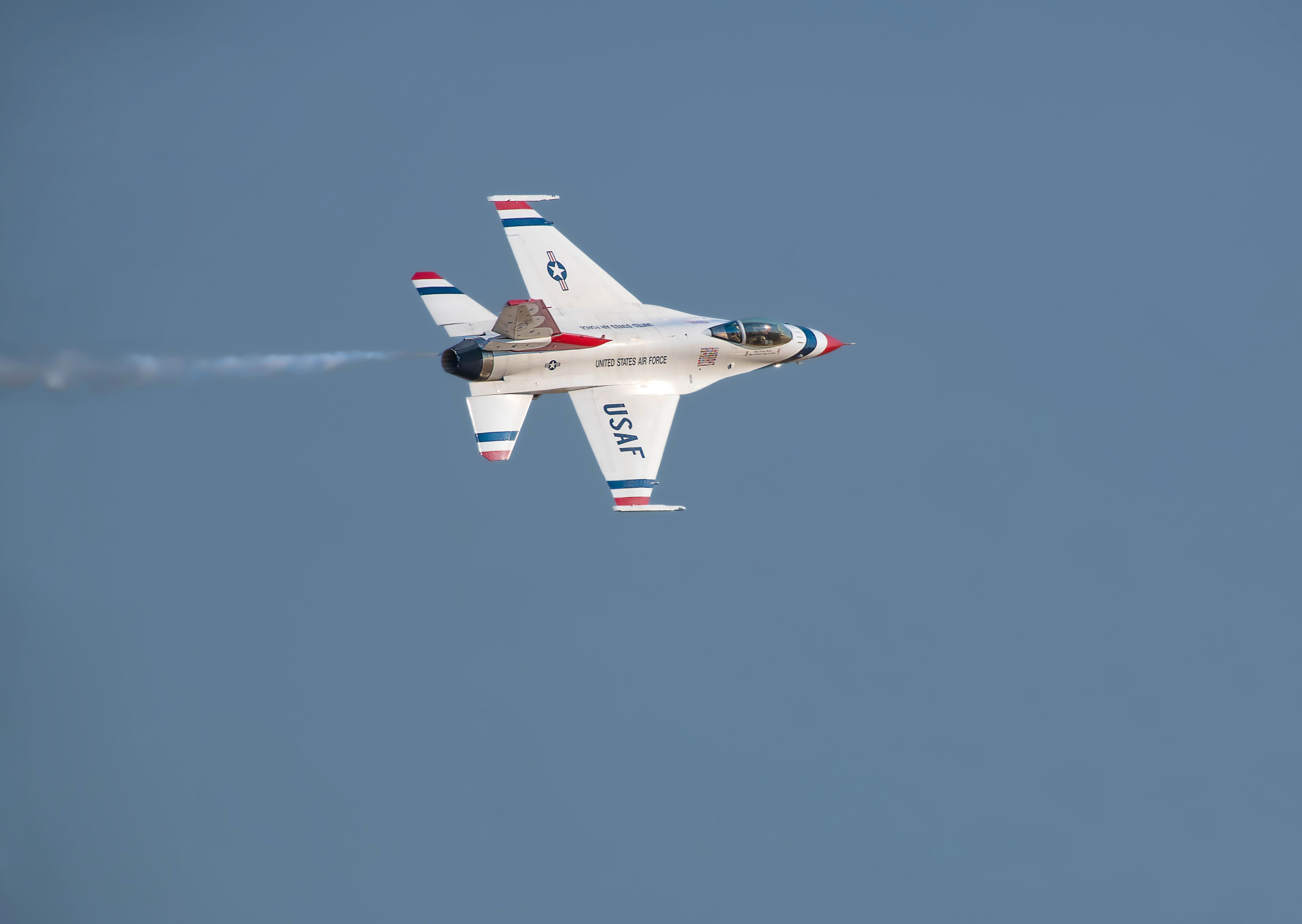 A jet flying through the sky · Free Stock Photo
