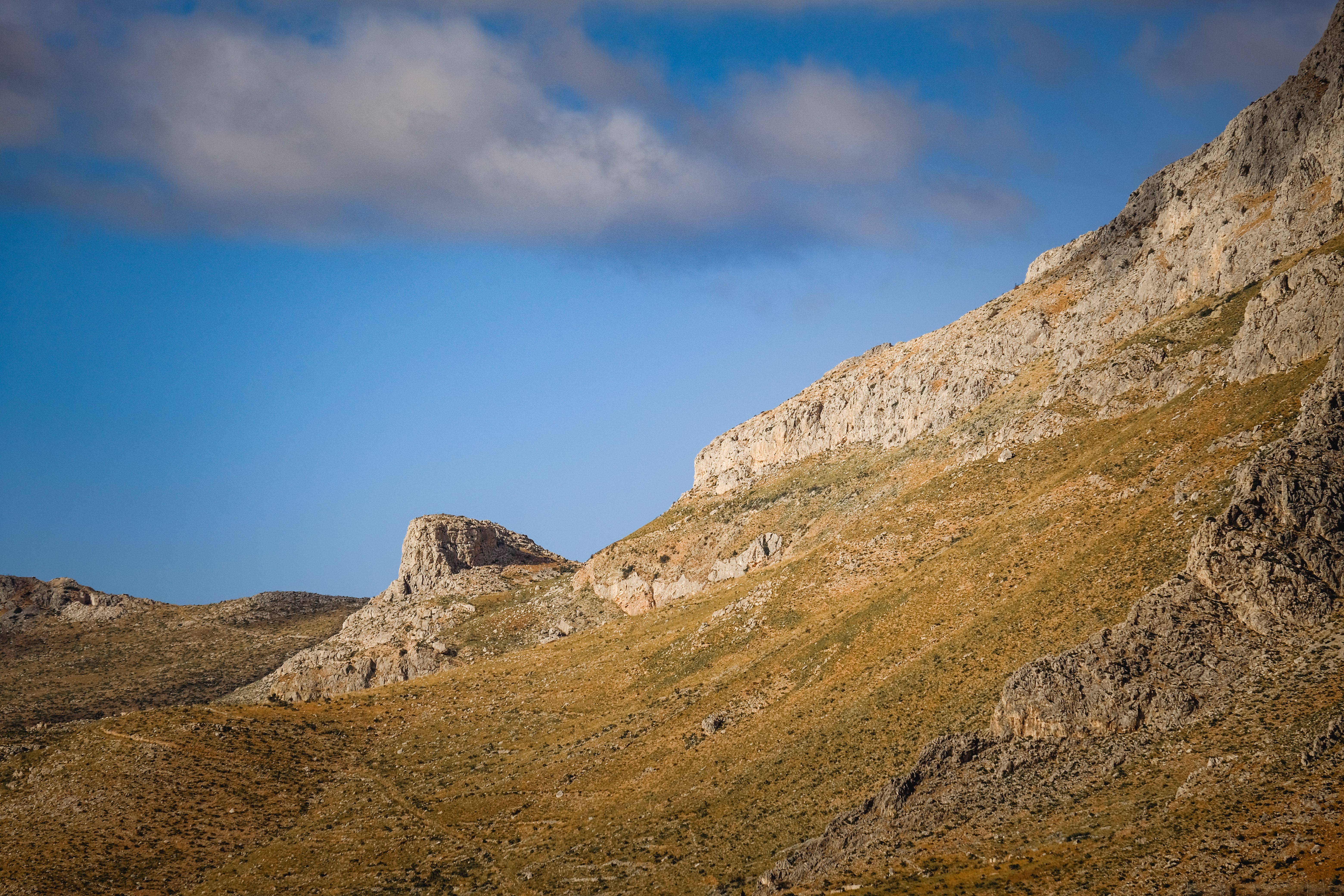 Green Hillside with Rocks · Free Stock Photo
