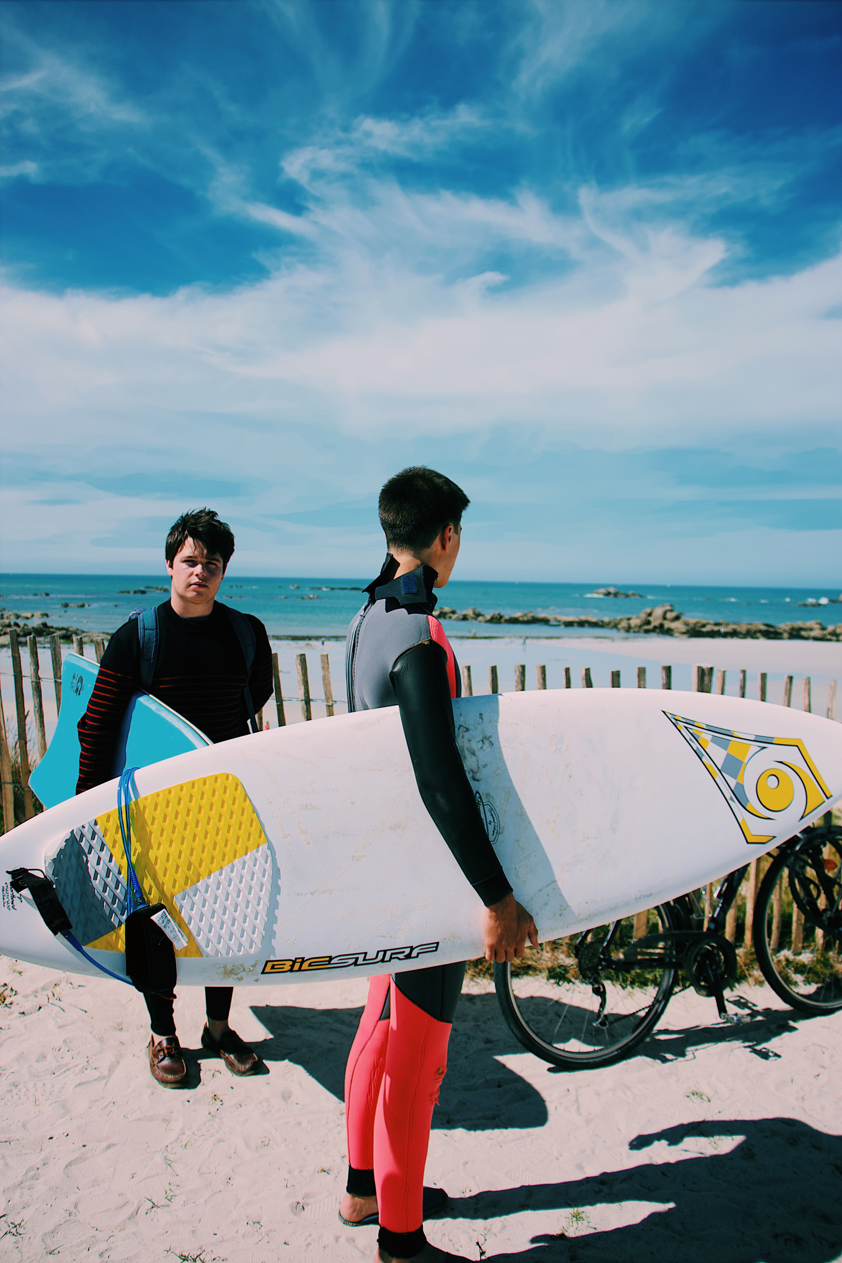 Male surfers with surfboard on beach · Free Stock Photo