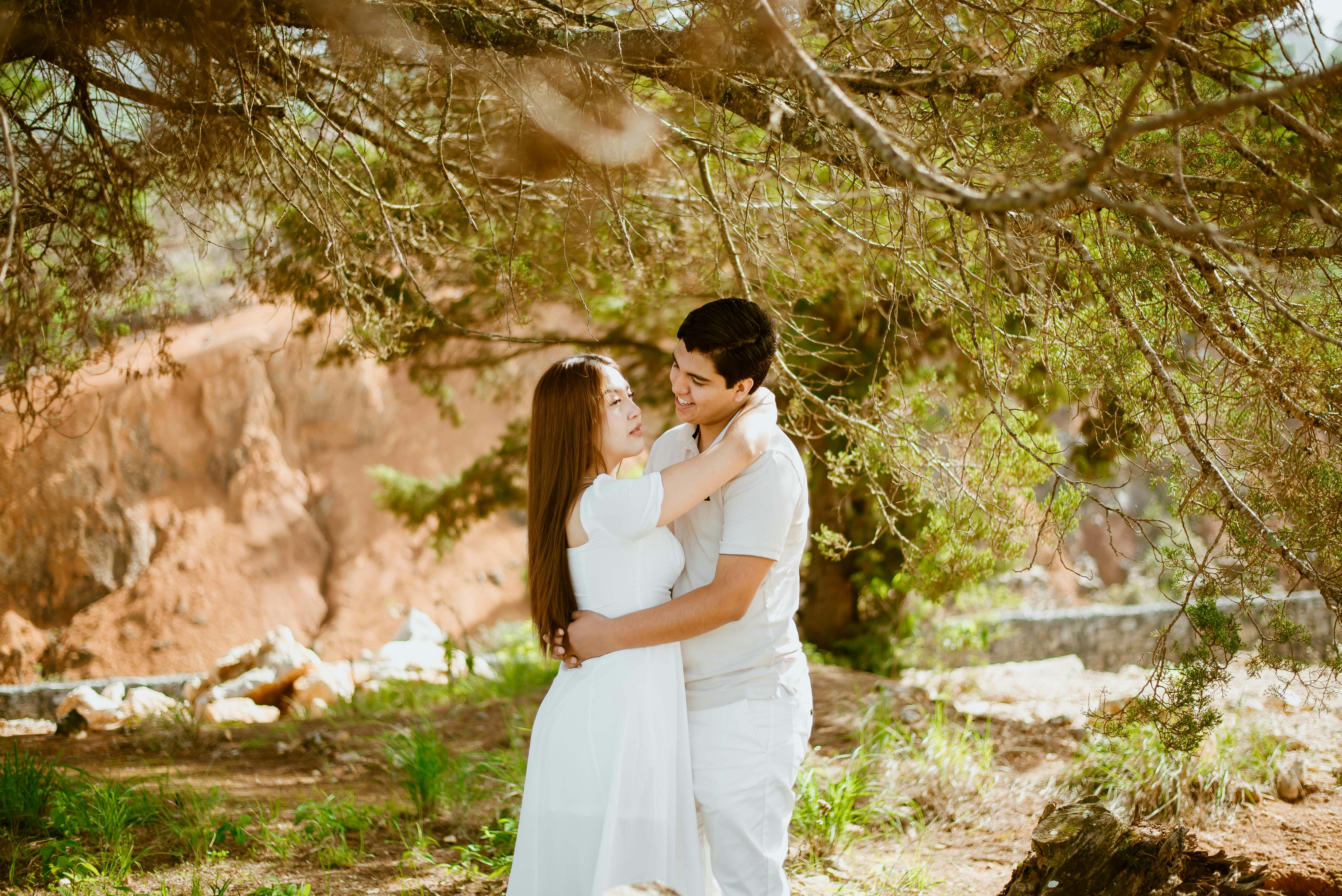 Couple Hugging under Tree · Free Stock Photo