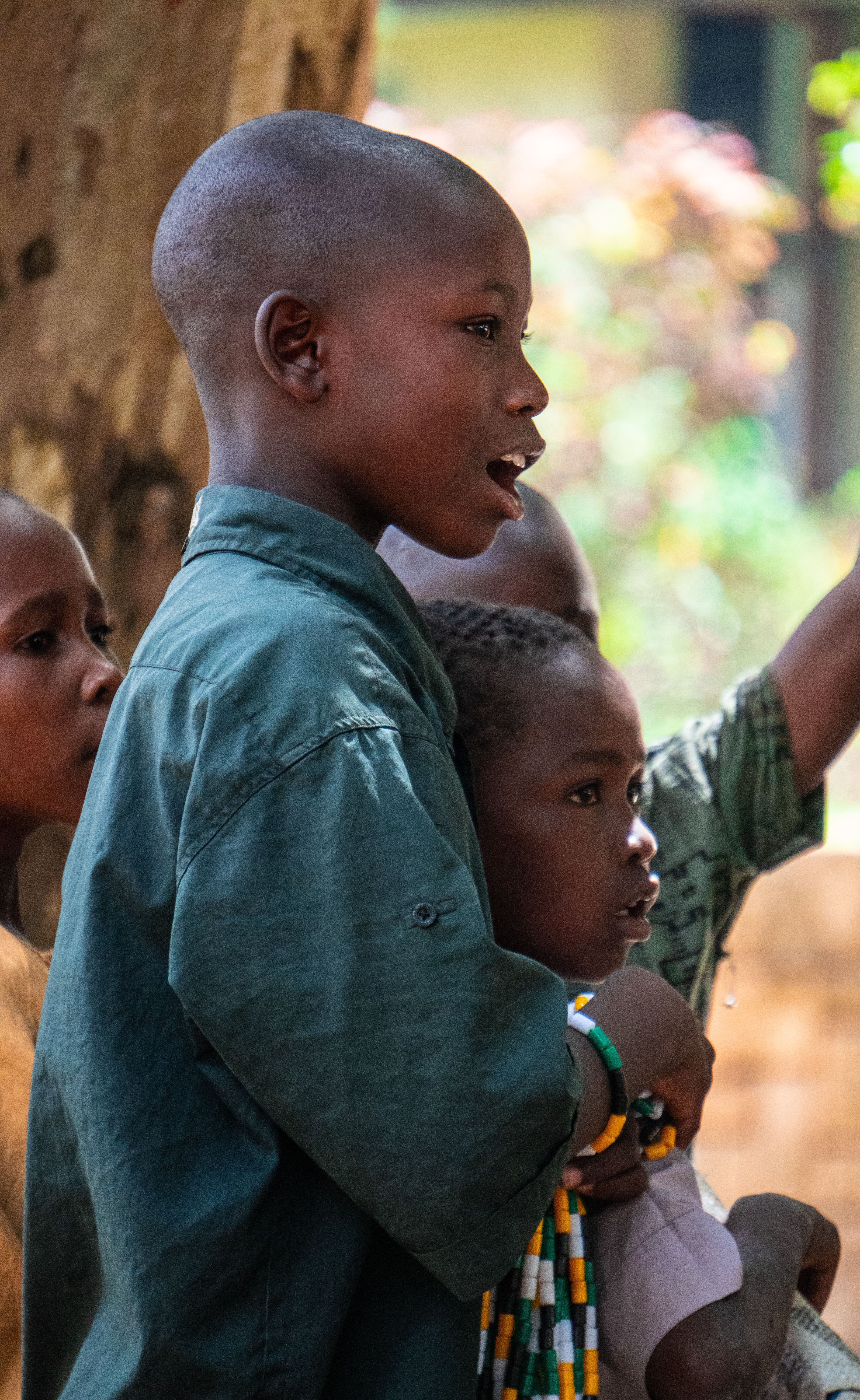 Boy in Shirt Standing with Children · Free Stock Photo