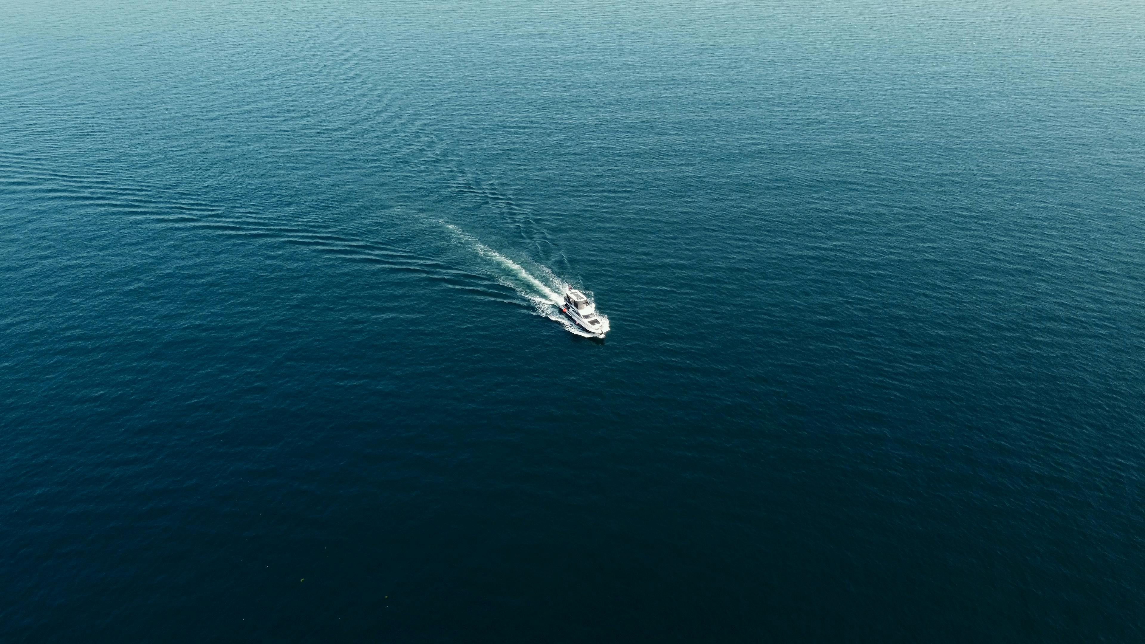 Aerial view of a boat in the ocean · Free Stock Photo