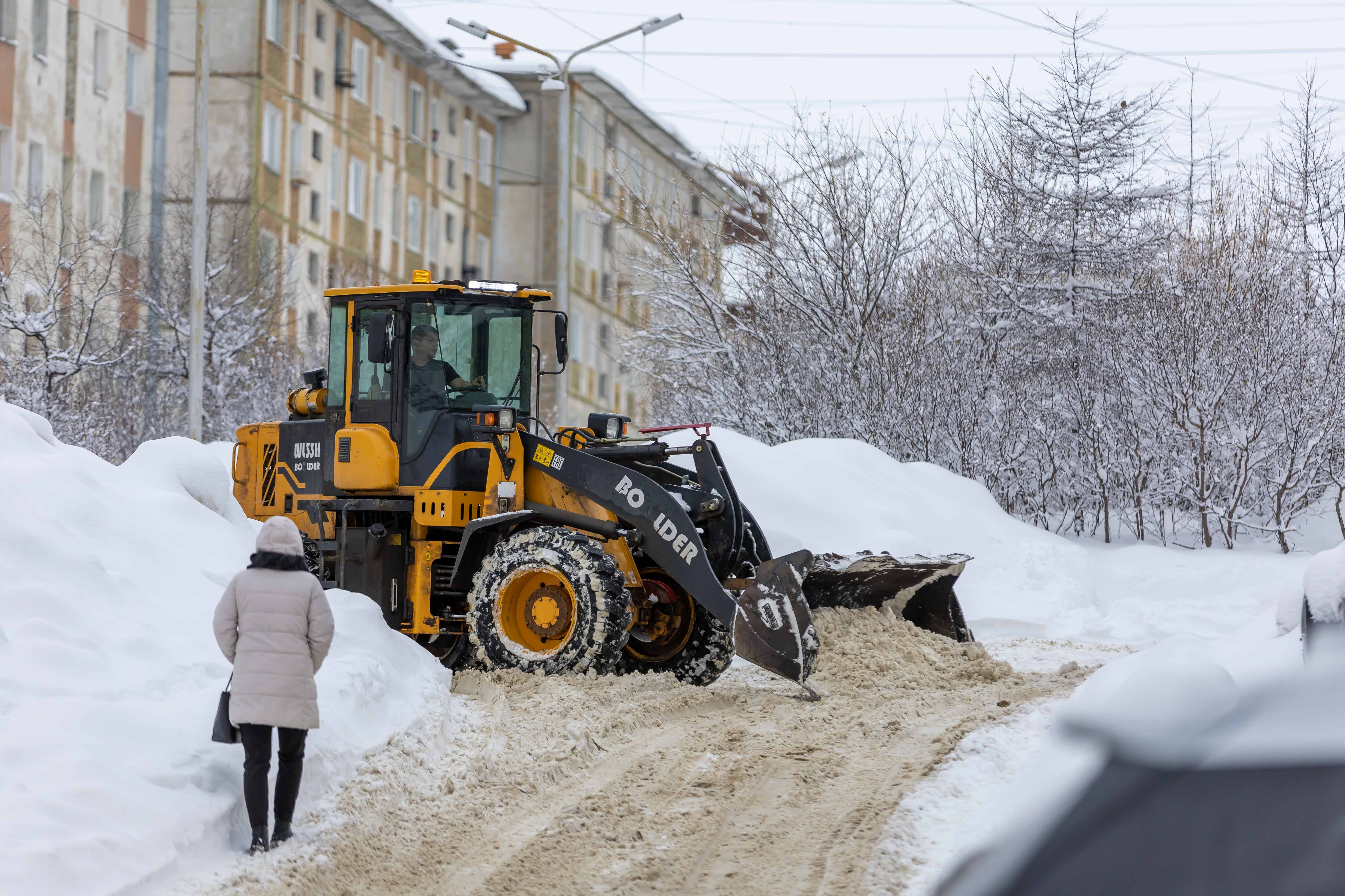 Yellow, Orange, and Black Truck Plowing Snow · Free Stock Photo
