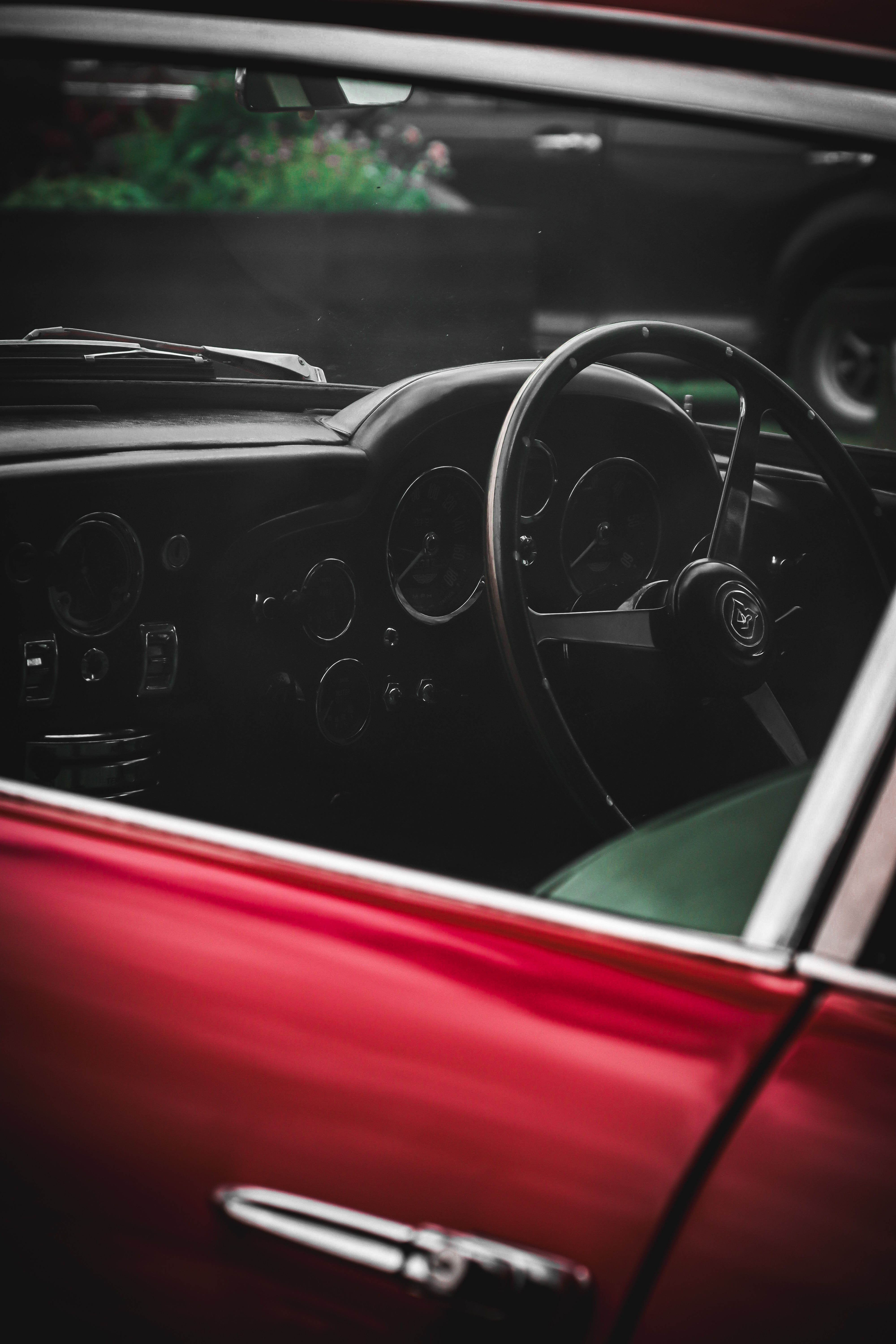 Black Classic Car Inside Well Lighted Room · Free Stock Photo