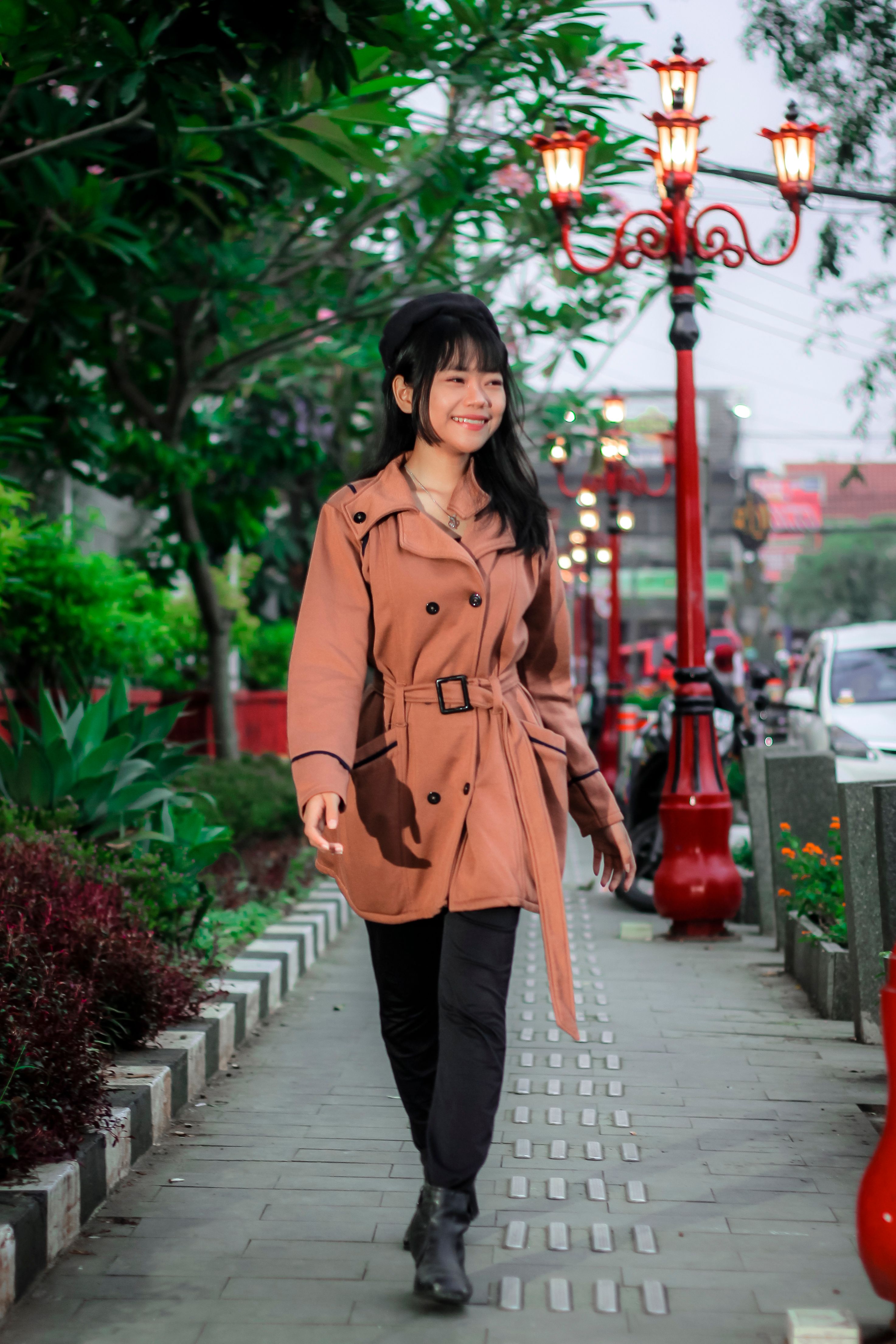 Photography of a Woman Walking on Pavement · Free Stock Photo