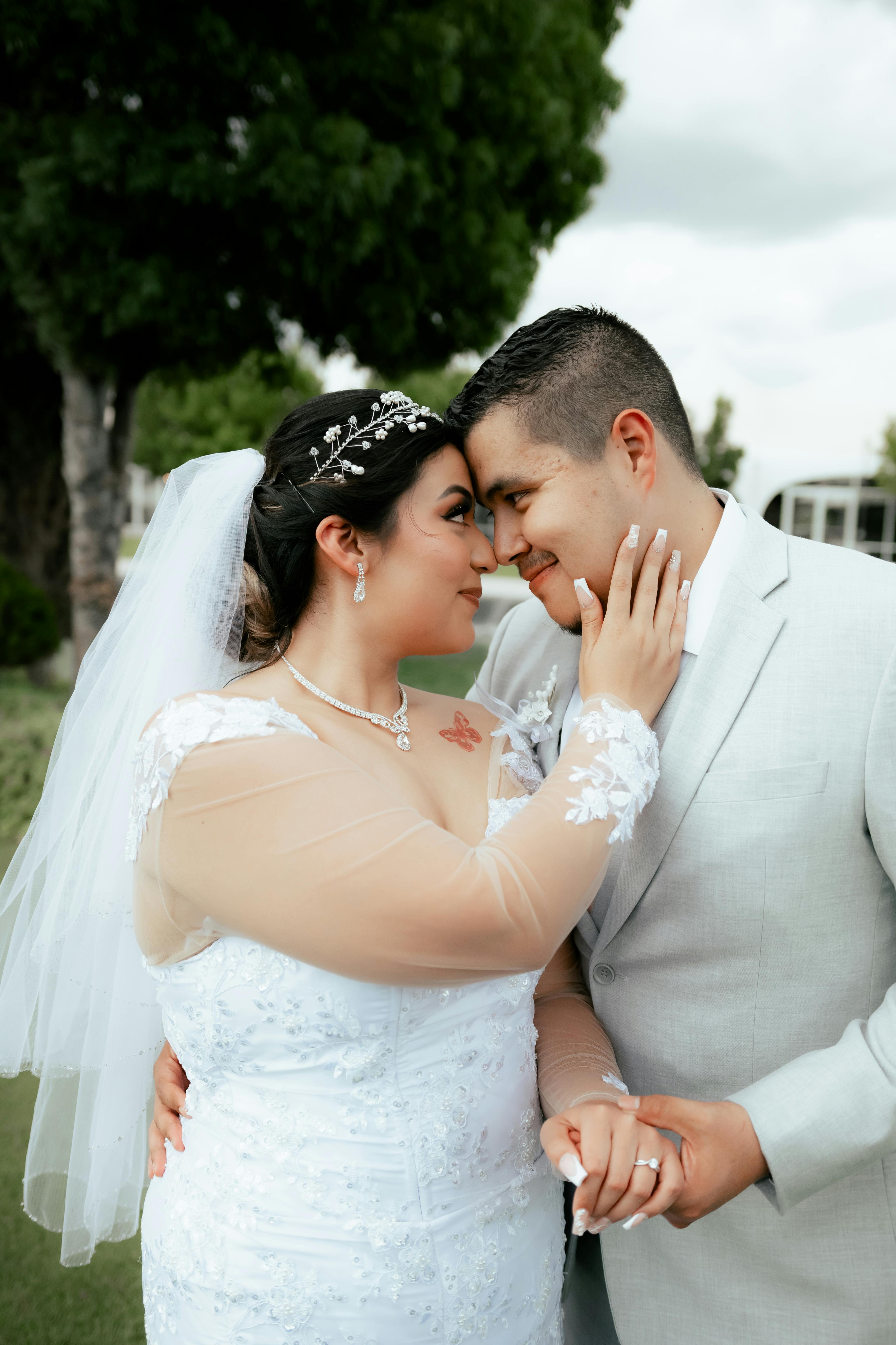 Newly Married Couple Hugging Each Other · Free Stock Photo