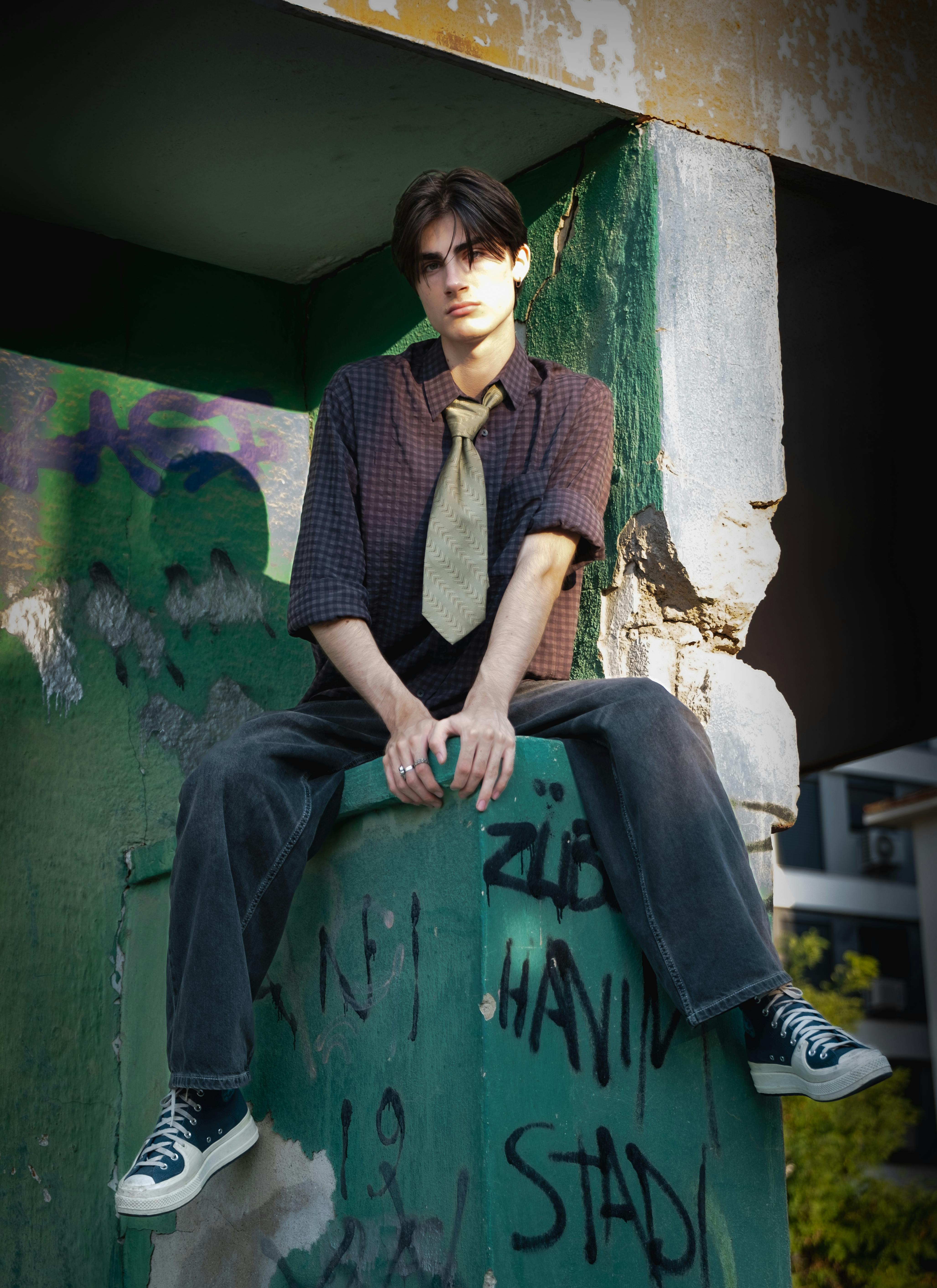 Urban Male Model in Street Style Fashion with Graffiti Background ...