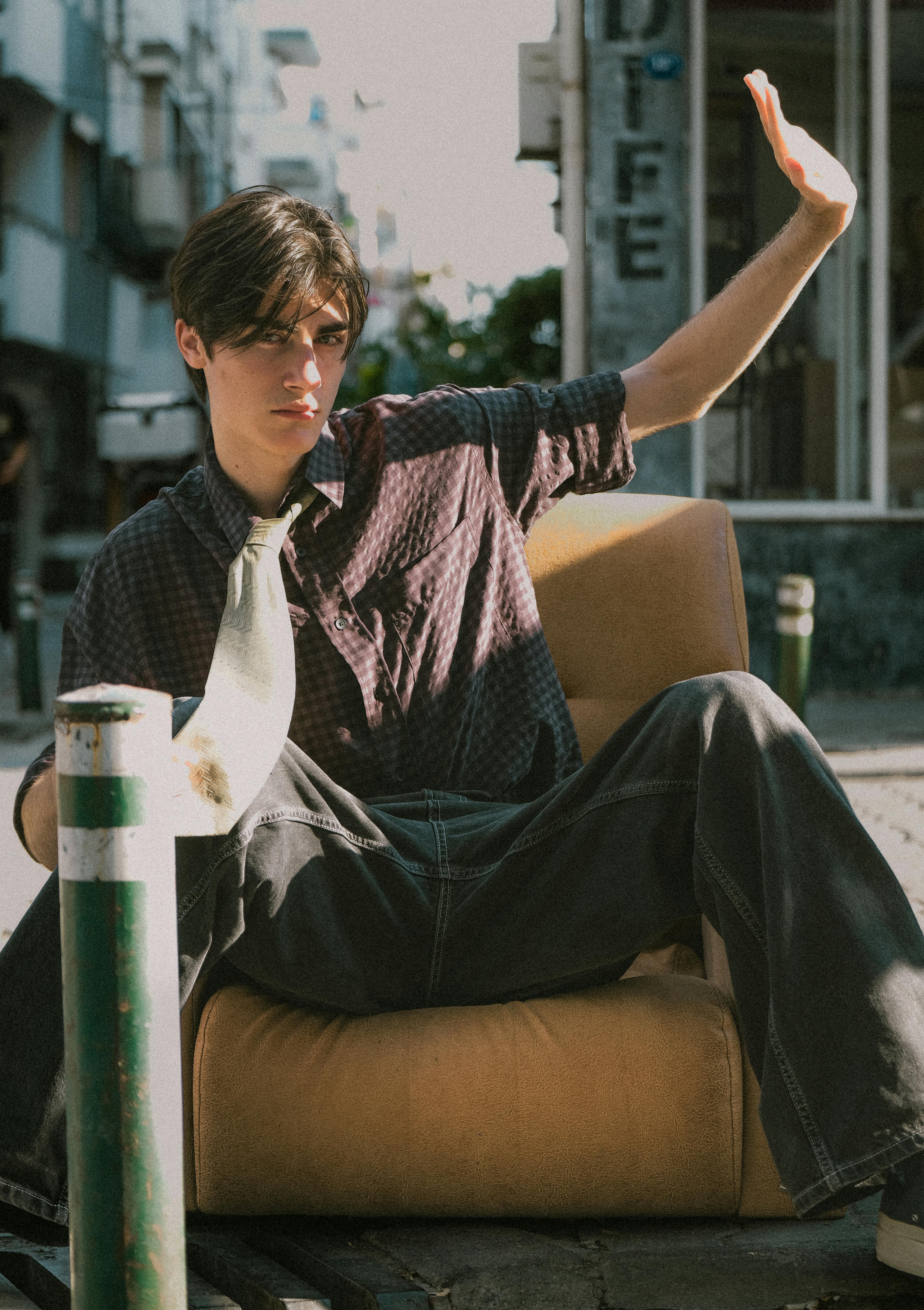 Stylish Male Model in Urban Setting with a Laid-Back Pose · Free Stock ...