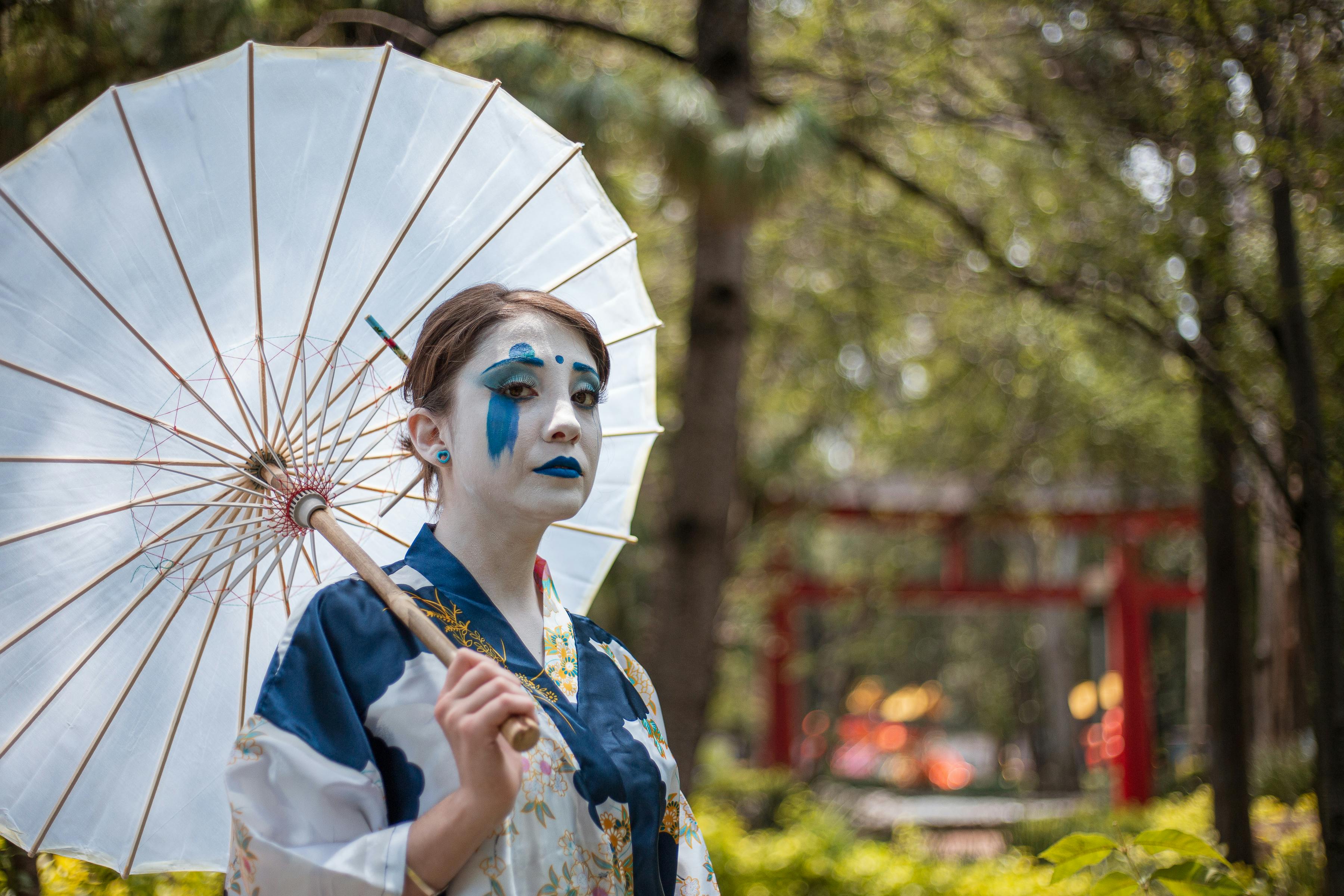 Portrait of Woman as Geisha with Umbrella · Free Stock Photo