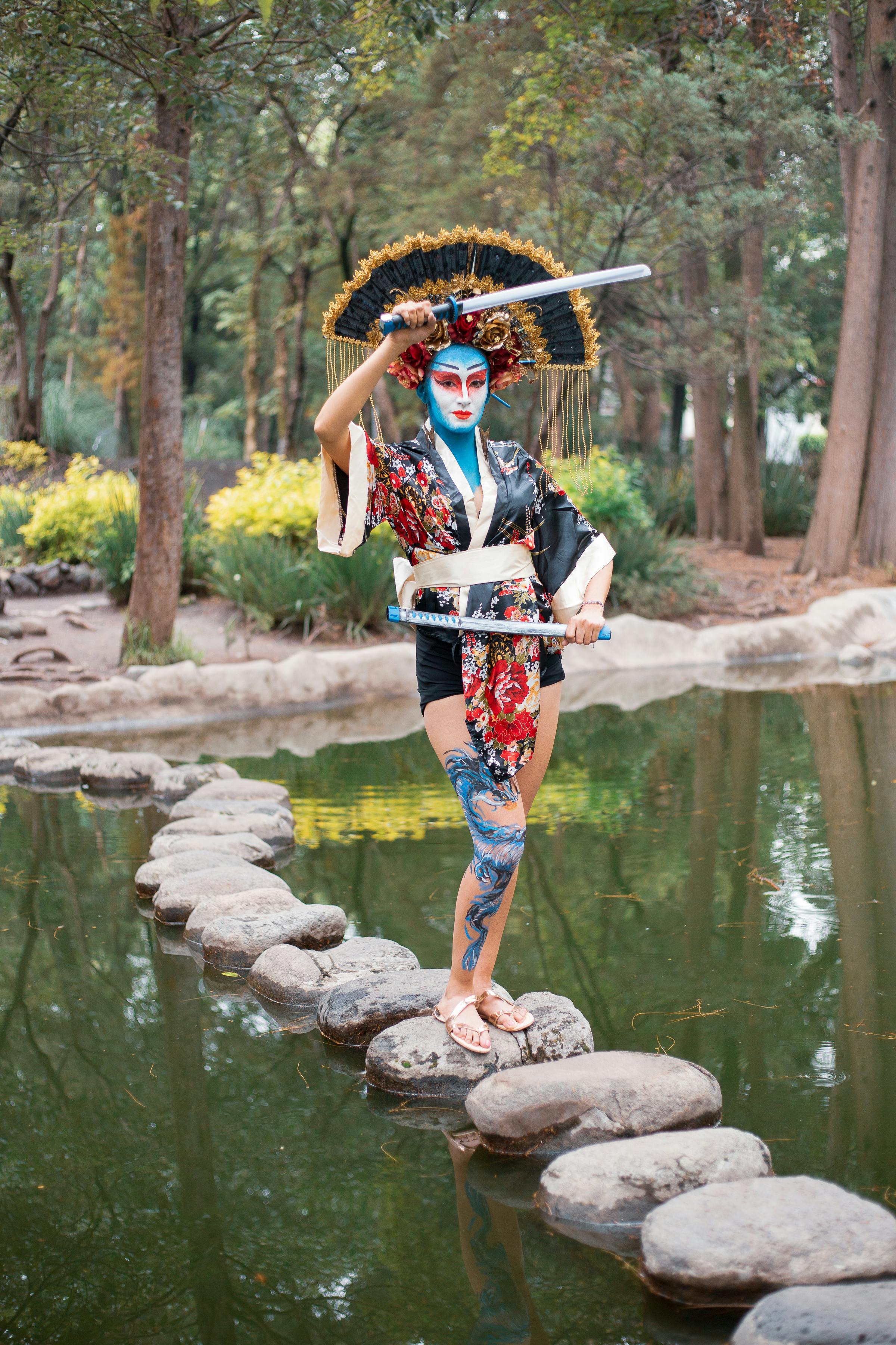 Geisha Standing with Katana on Pond · Free Stock Photo