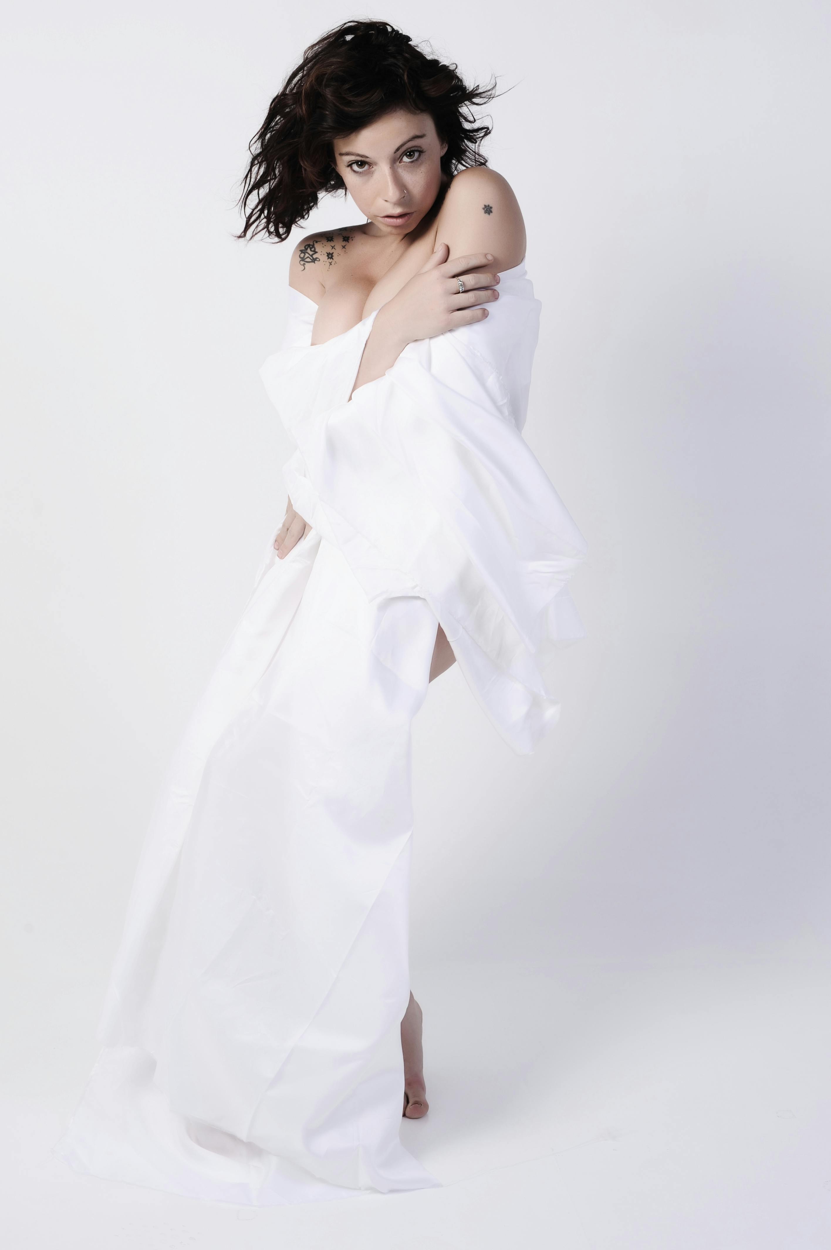 Woman Wrapped in White Cloth · Free Stock Photo
