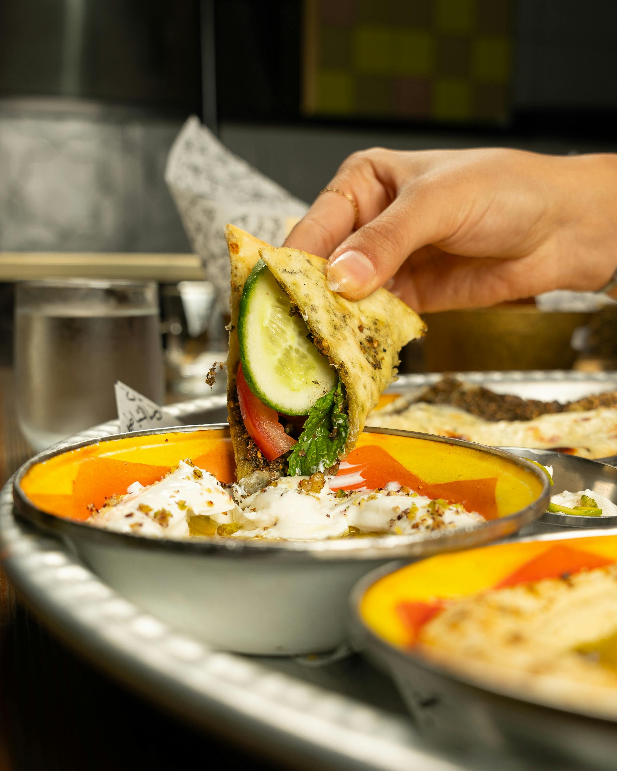 Person Hand over Bowl of Food · Free Stock Photo
