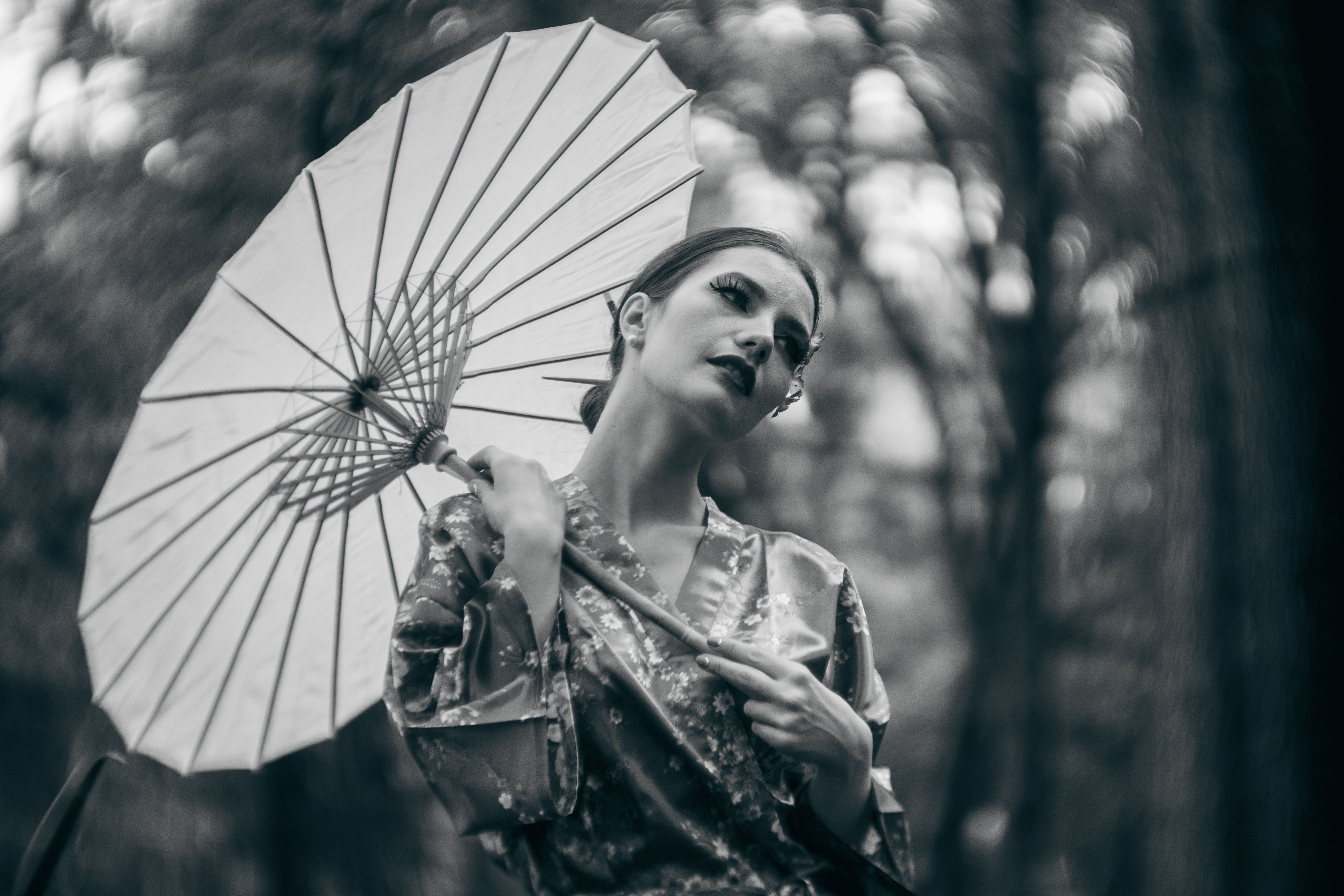 Geisha Standing with Umbrella · Free Stock Photo