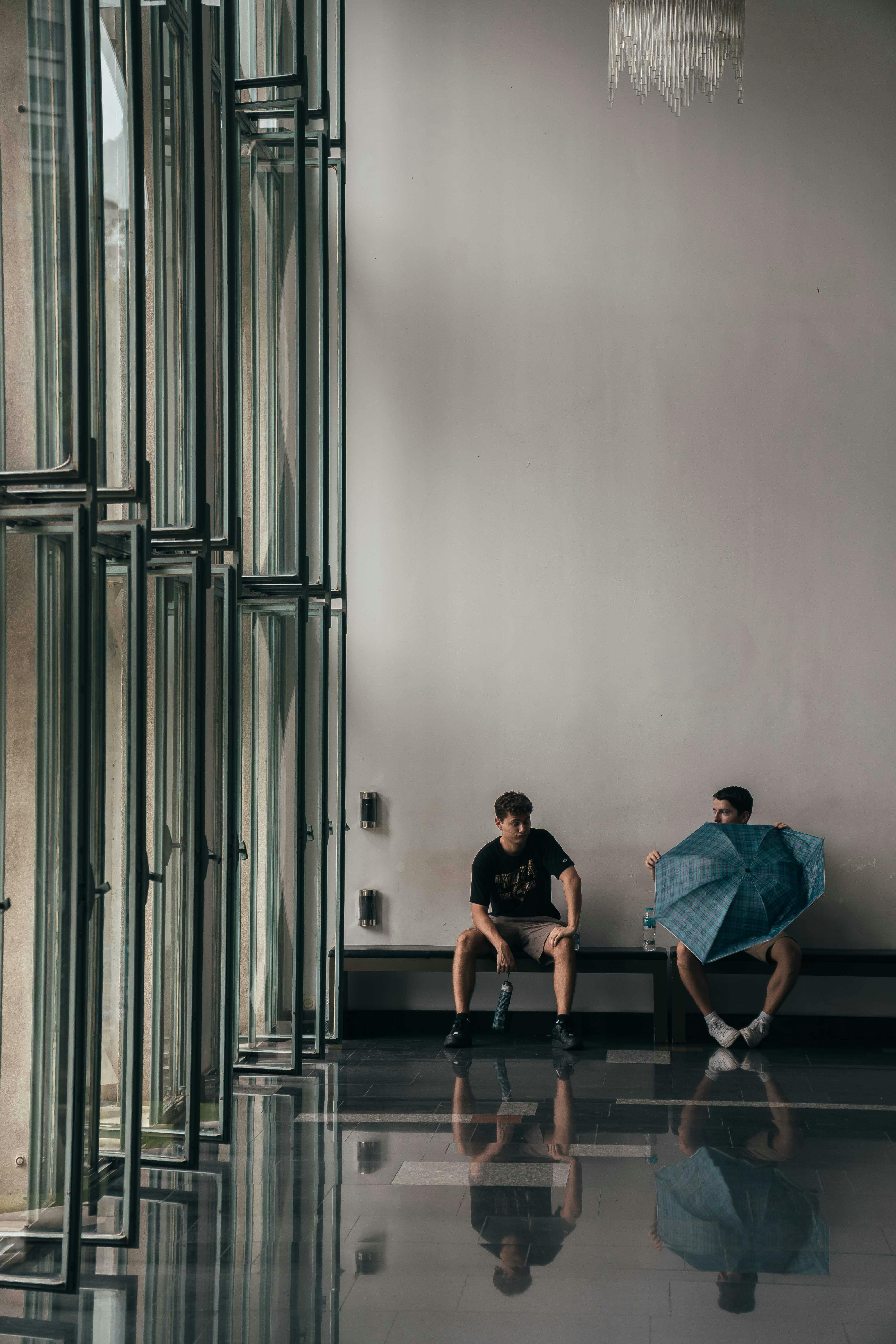 Men Reflecting in Floor · Free Stock Photo