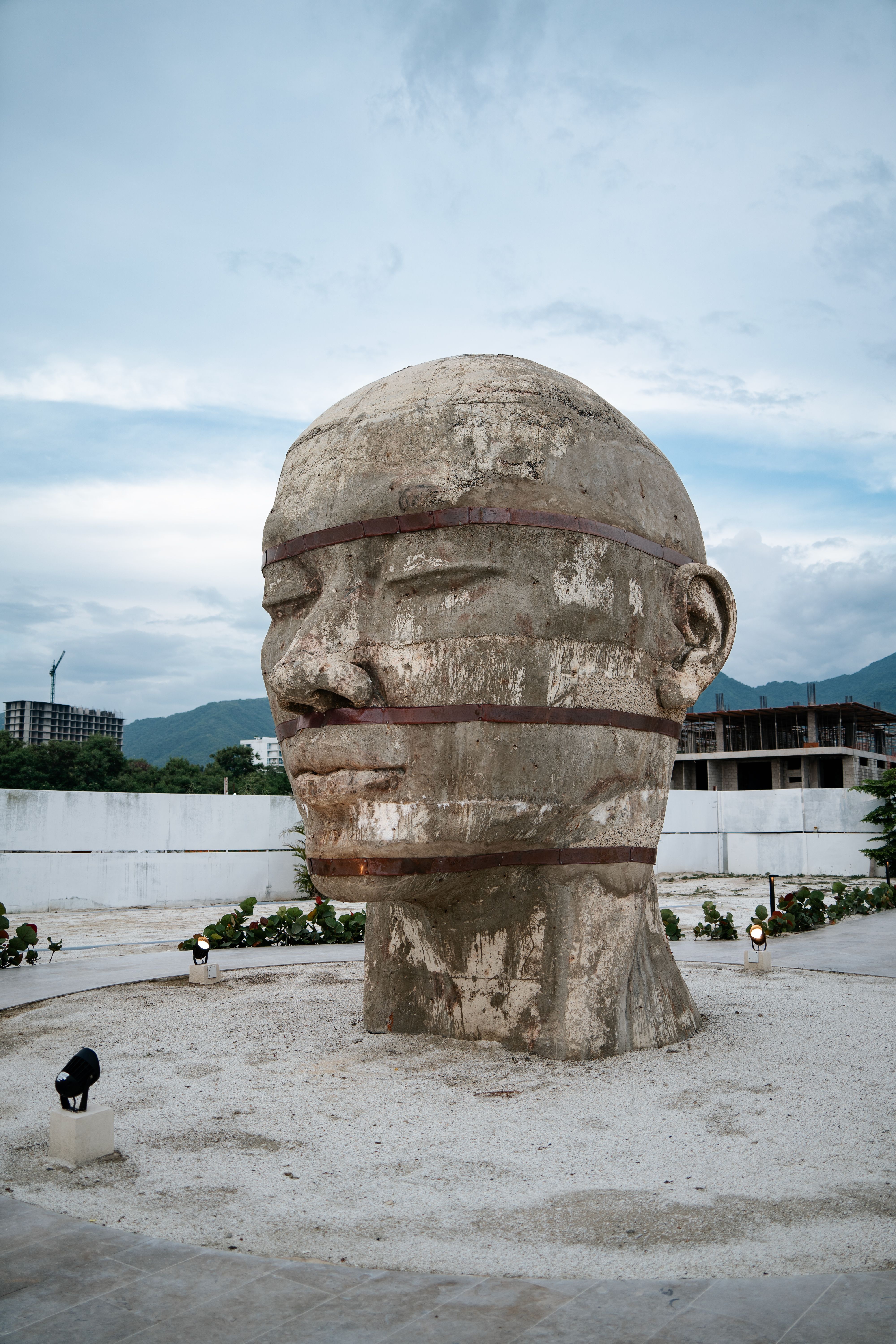 A Giant Head Statue in a City · Free Stock Photo