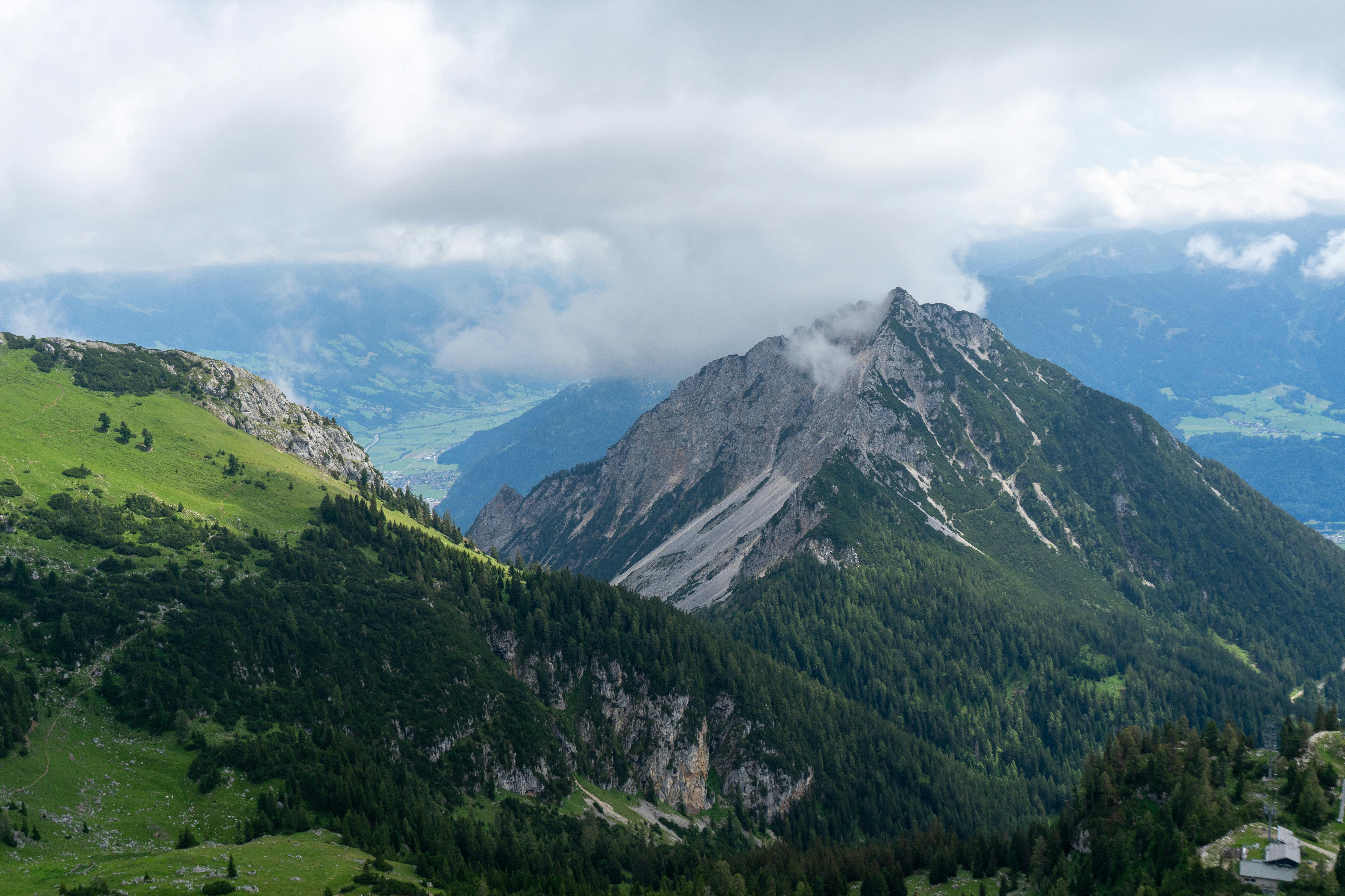 A view of the mountains from a mountain top · Free Stock Photo