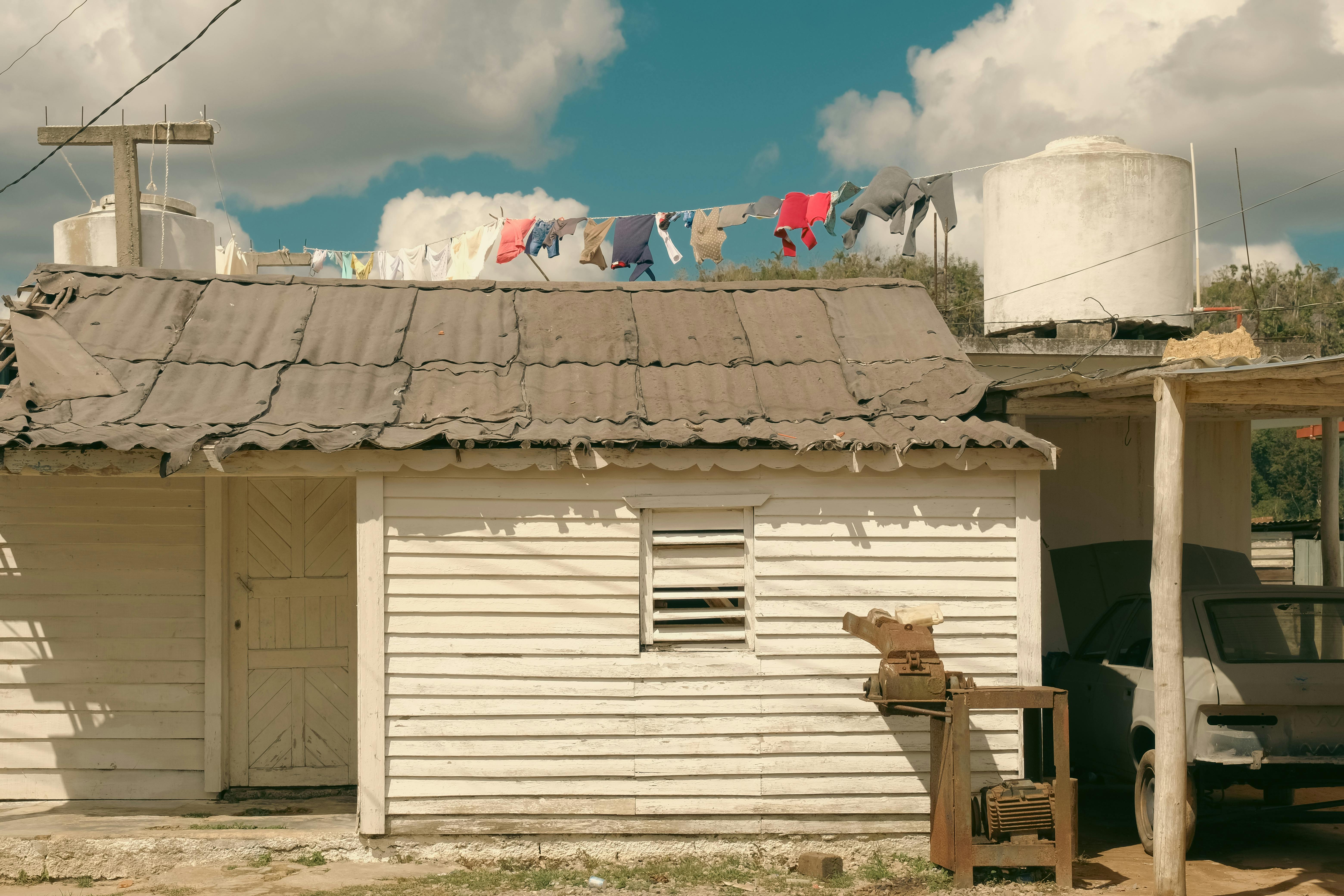 A small shack with clothes hanging on the line · Free Stock Photo