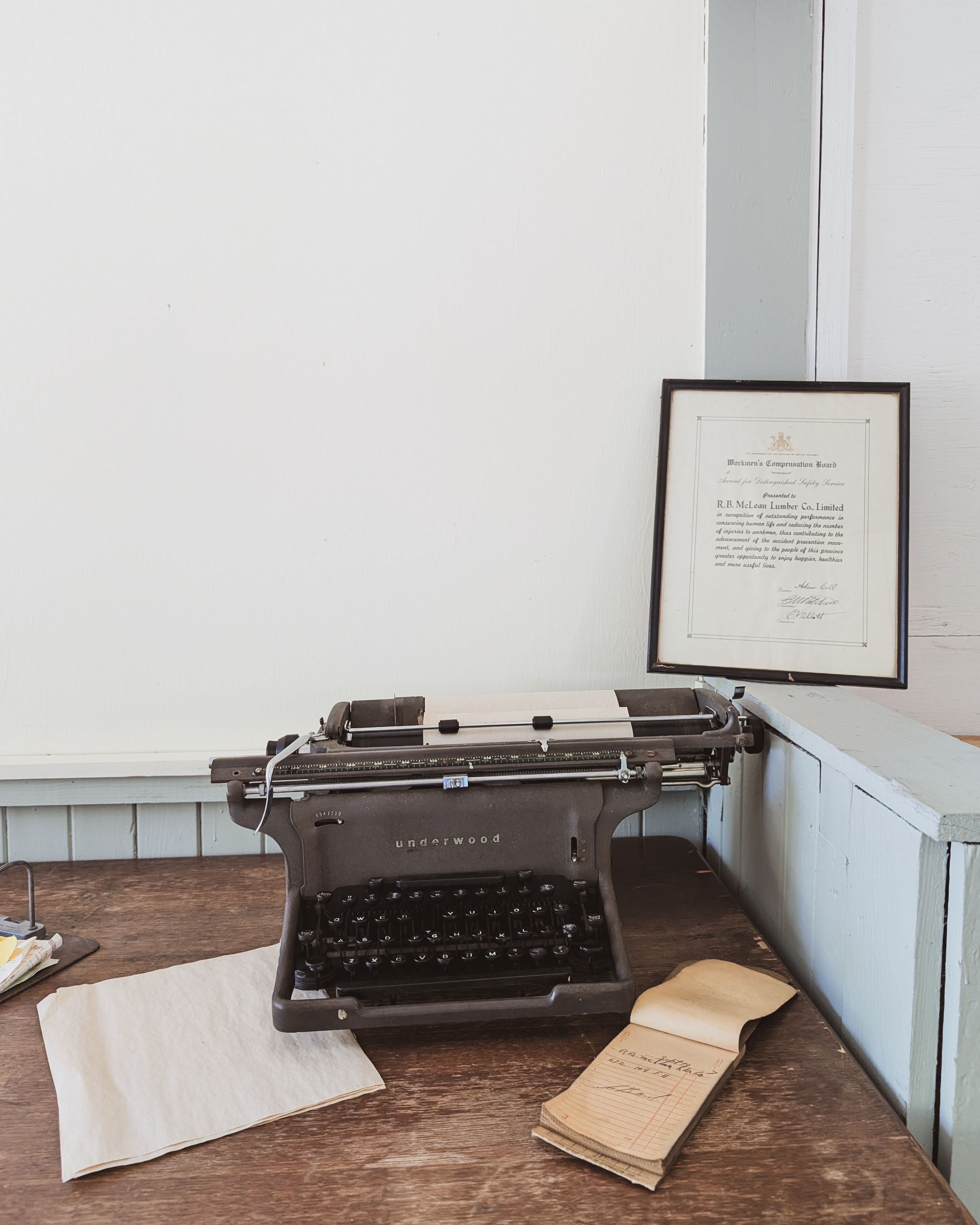 Vintage Typewriter and Telephone on the Table · Free Stock Photo