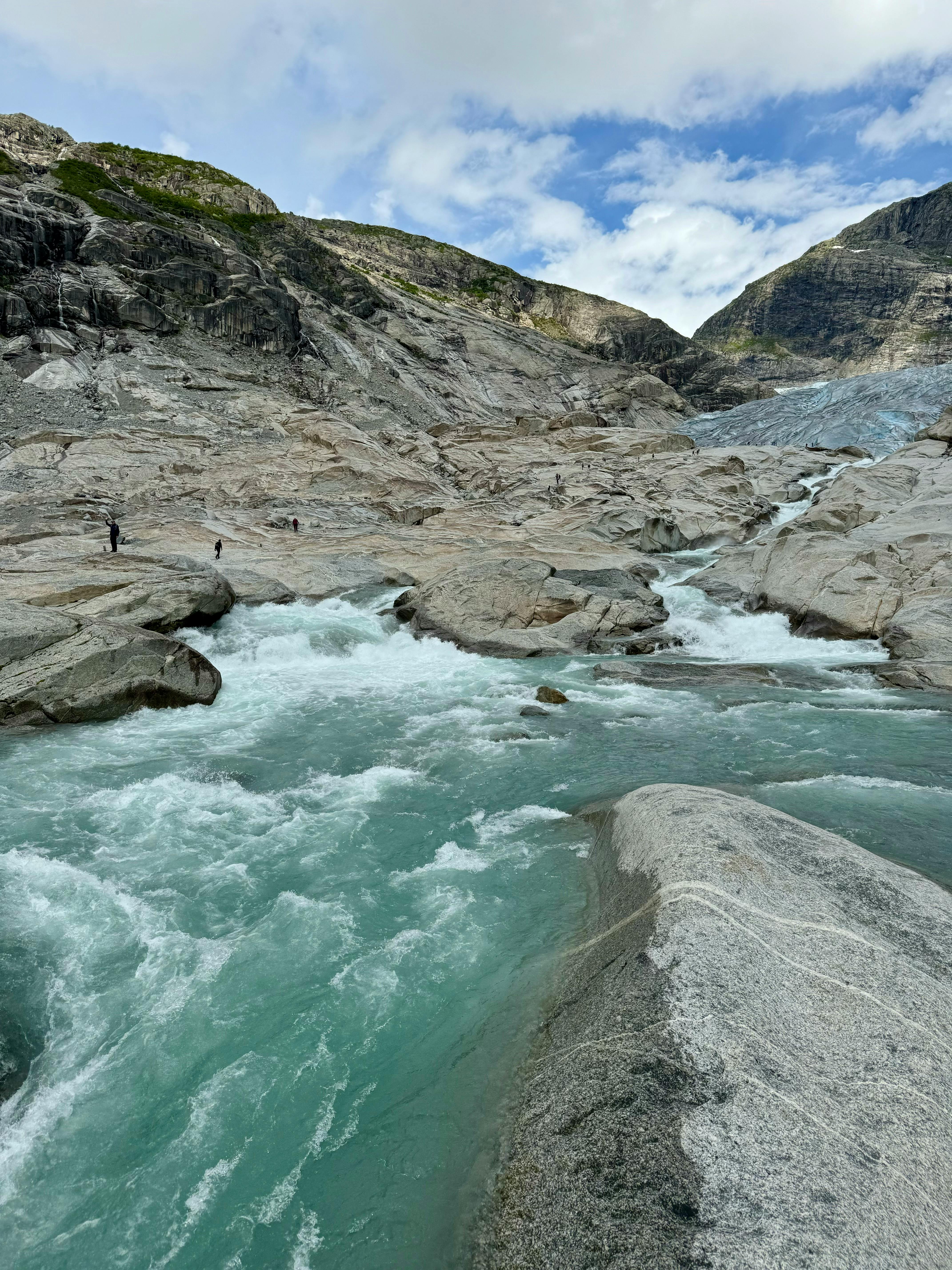 Concrete Bridge over Clear Blue River Beside Mountain · Free Stock Photo