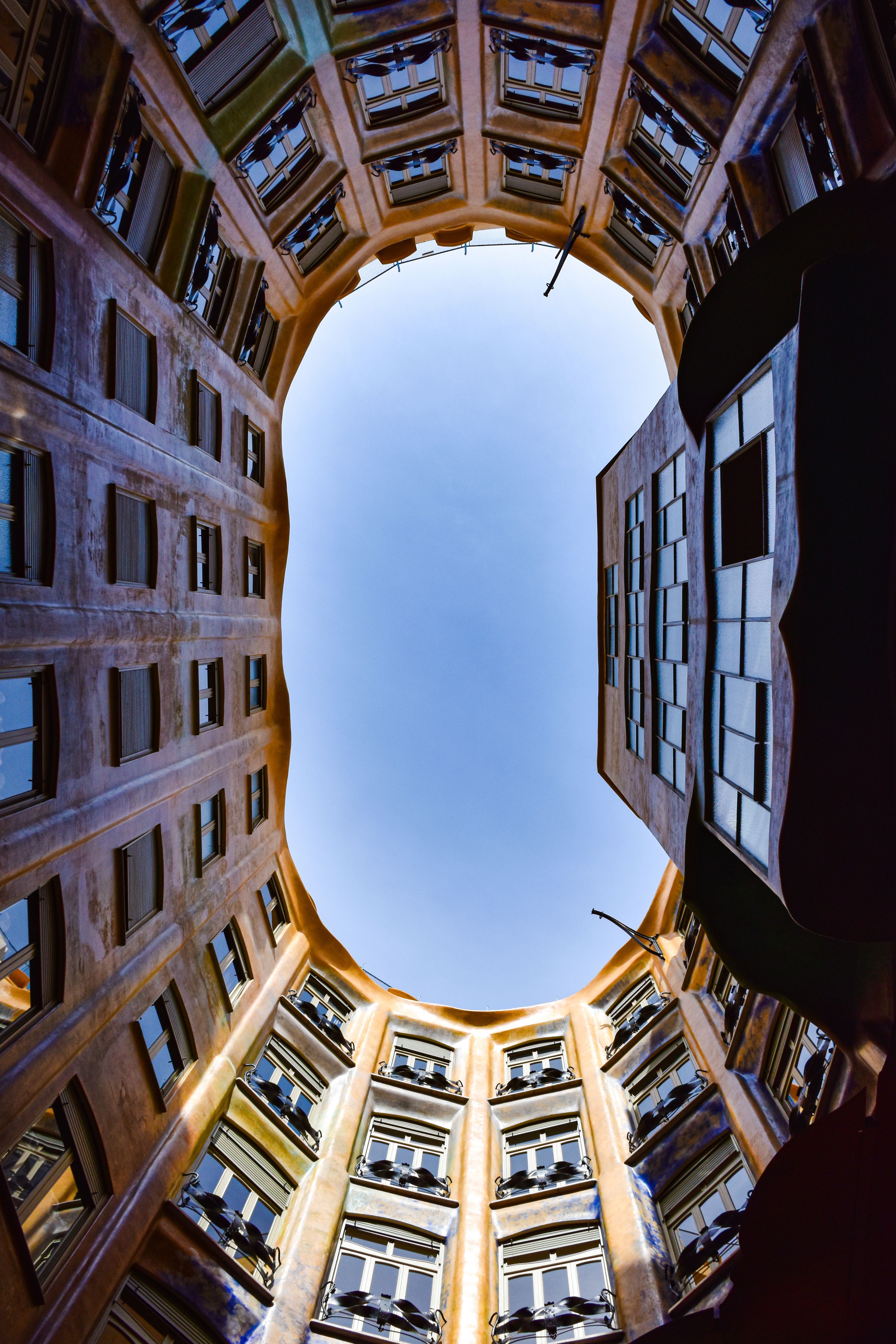 Low Angle Photography of Round Building · Free Stock Photo