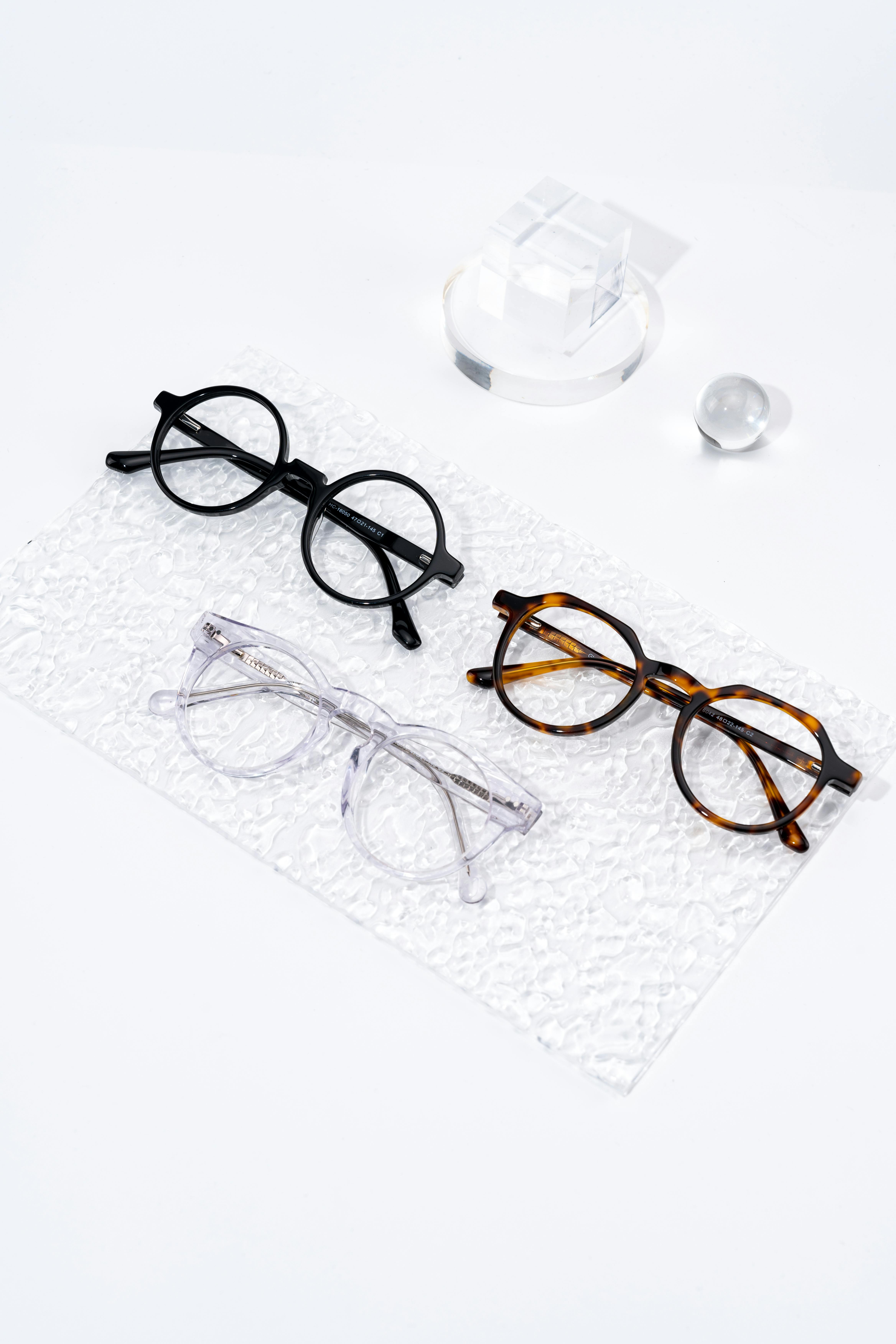 Stylish Eyewear in a Minimalist Setting · Free Stock Photo