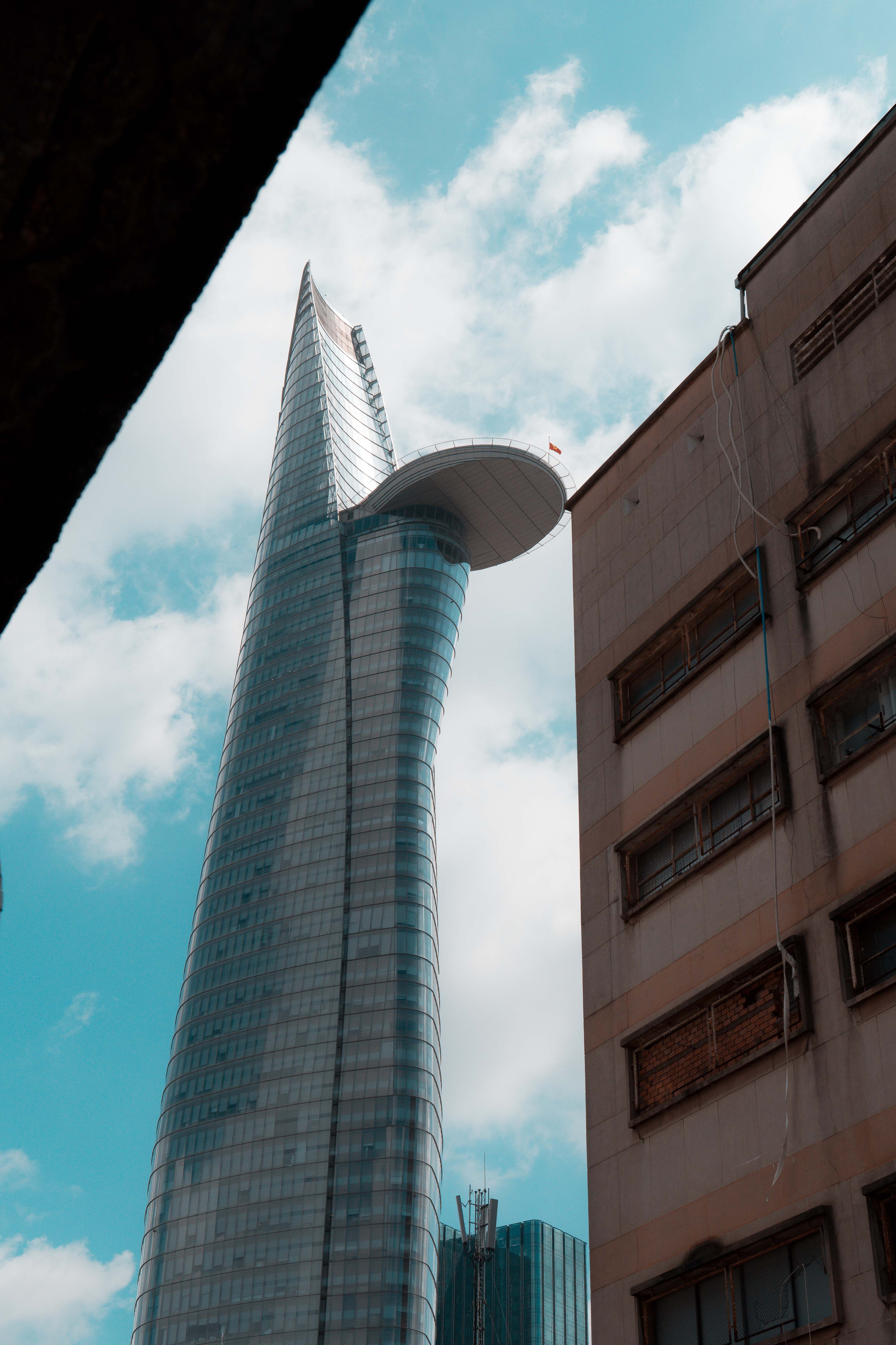 A tall building with a very tall tower · Free Stock Photo