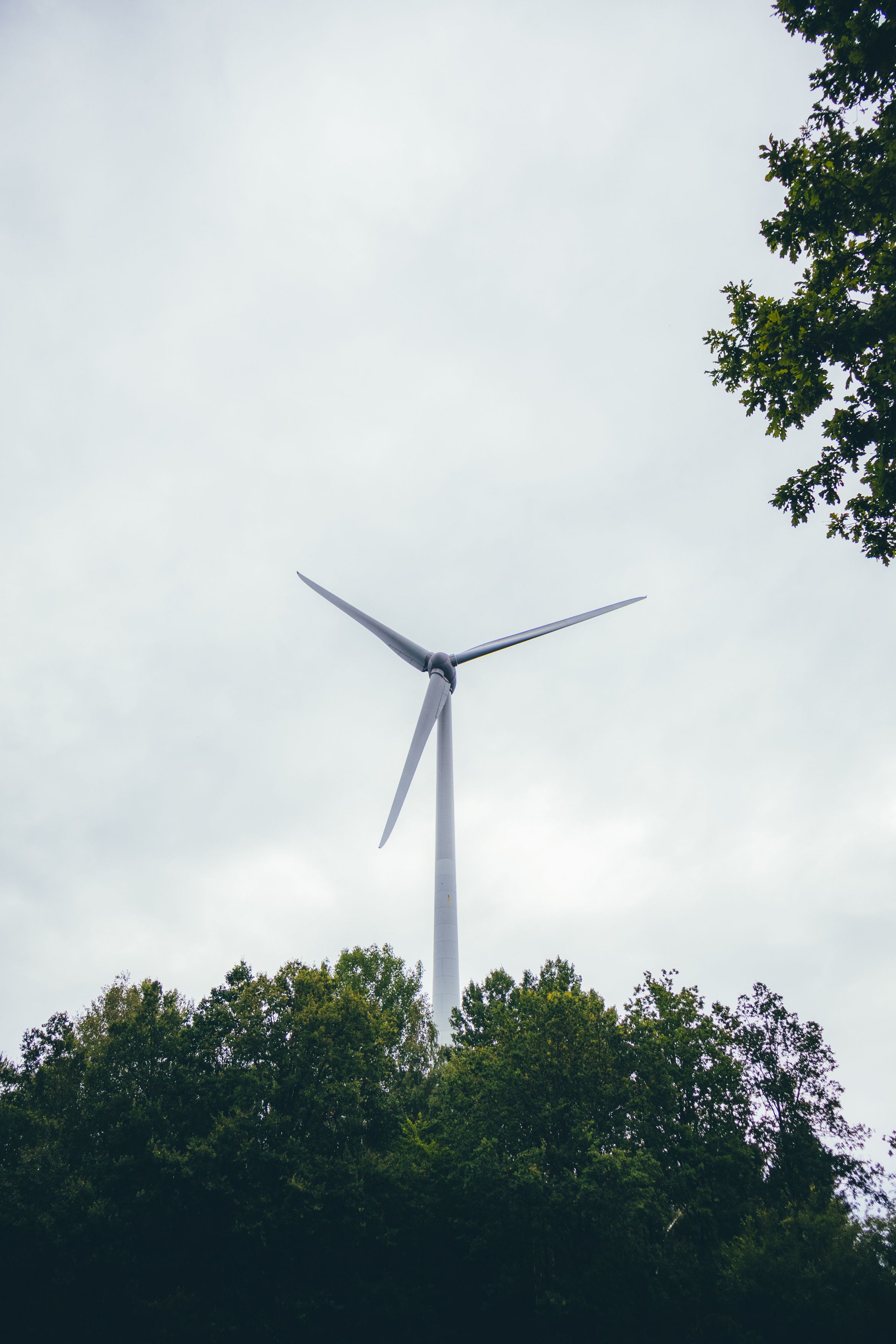 White 3-blade Windmill Under Cloudy Sky · Free Stock Photo