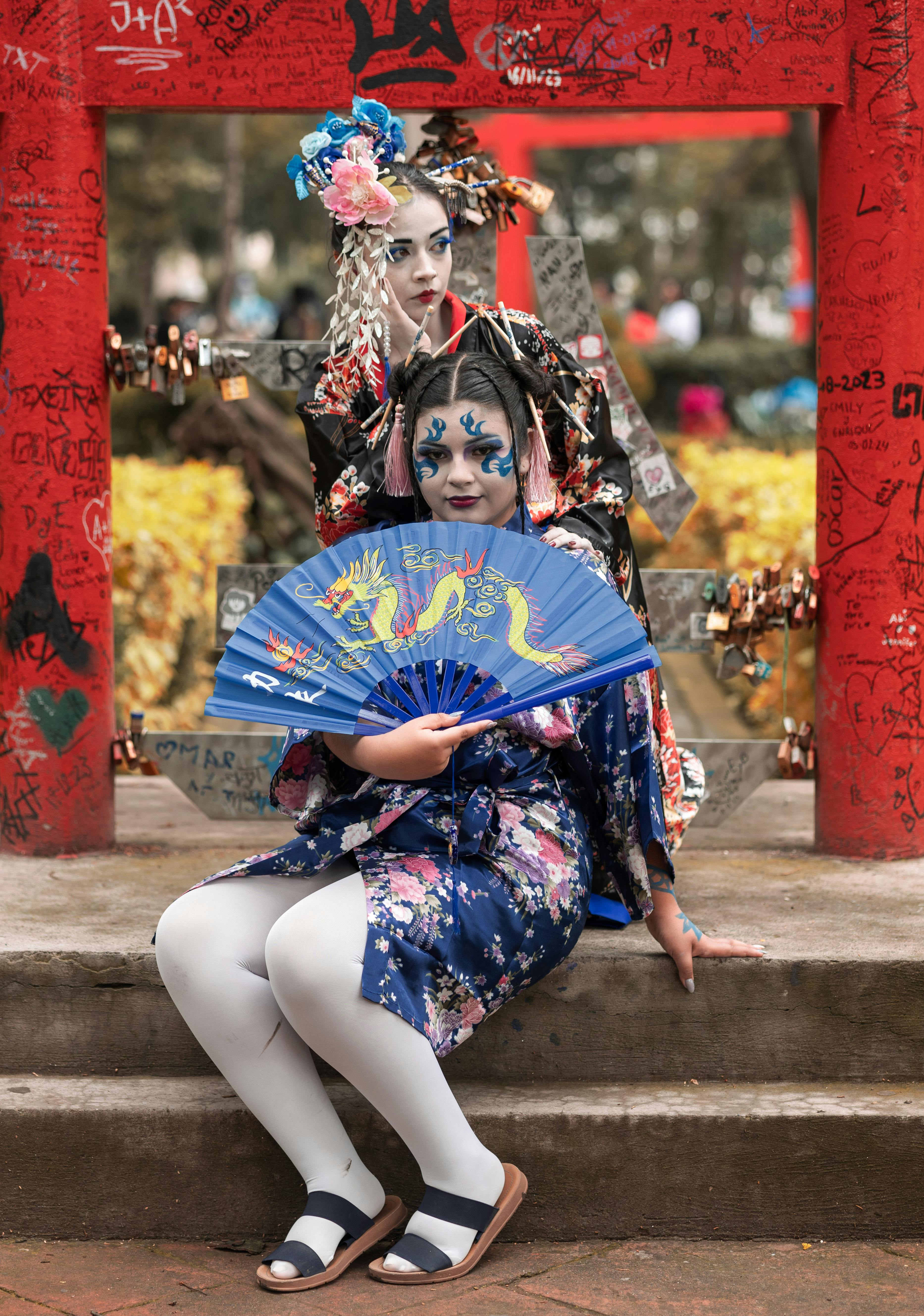 Two women dressed in japanese costumes pose for a photo · Free Stock Photo