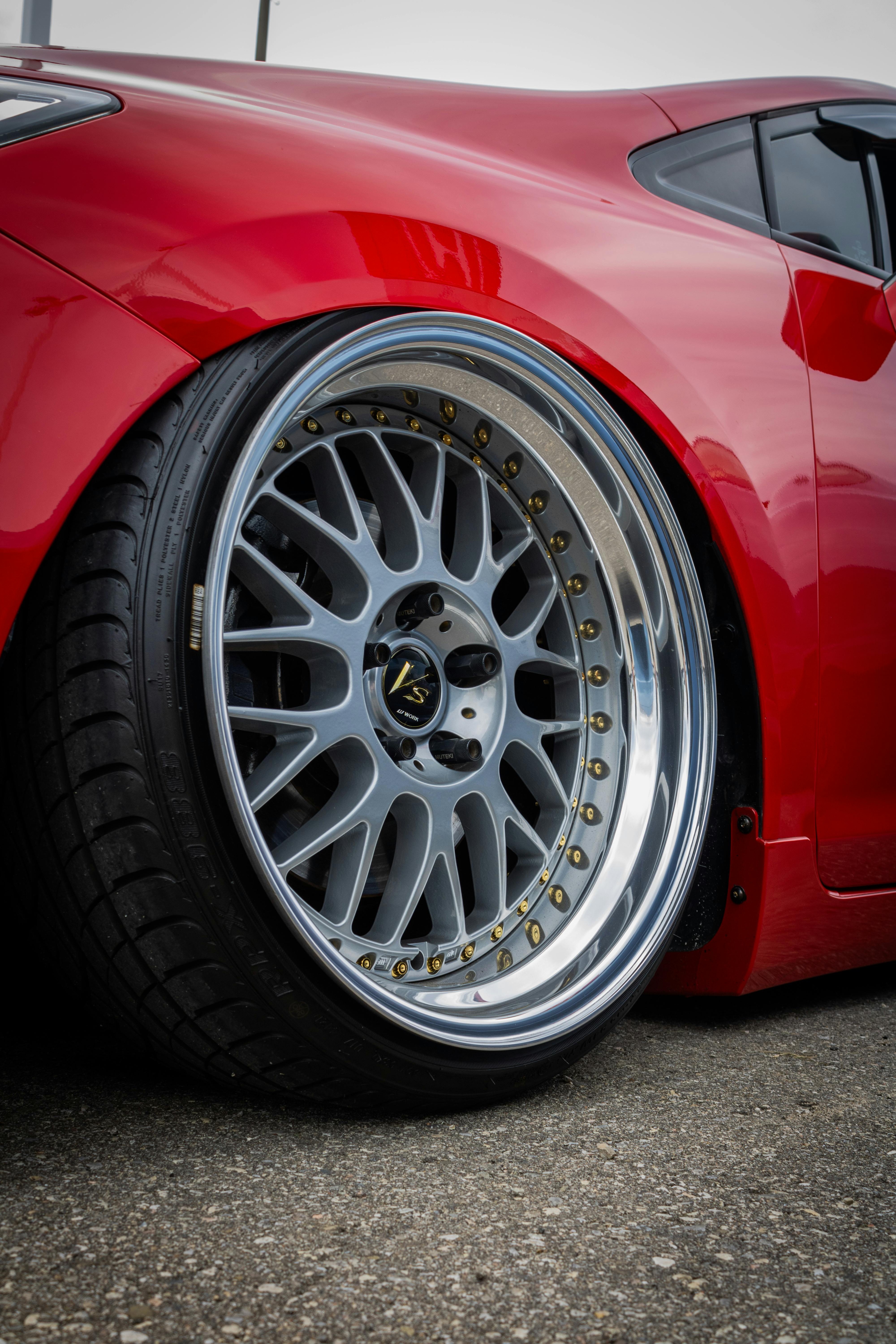 Photography of Red Car On Asphalt Road · Free Stock Photo