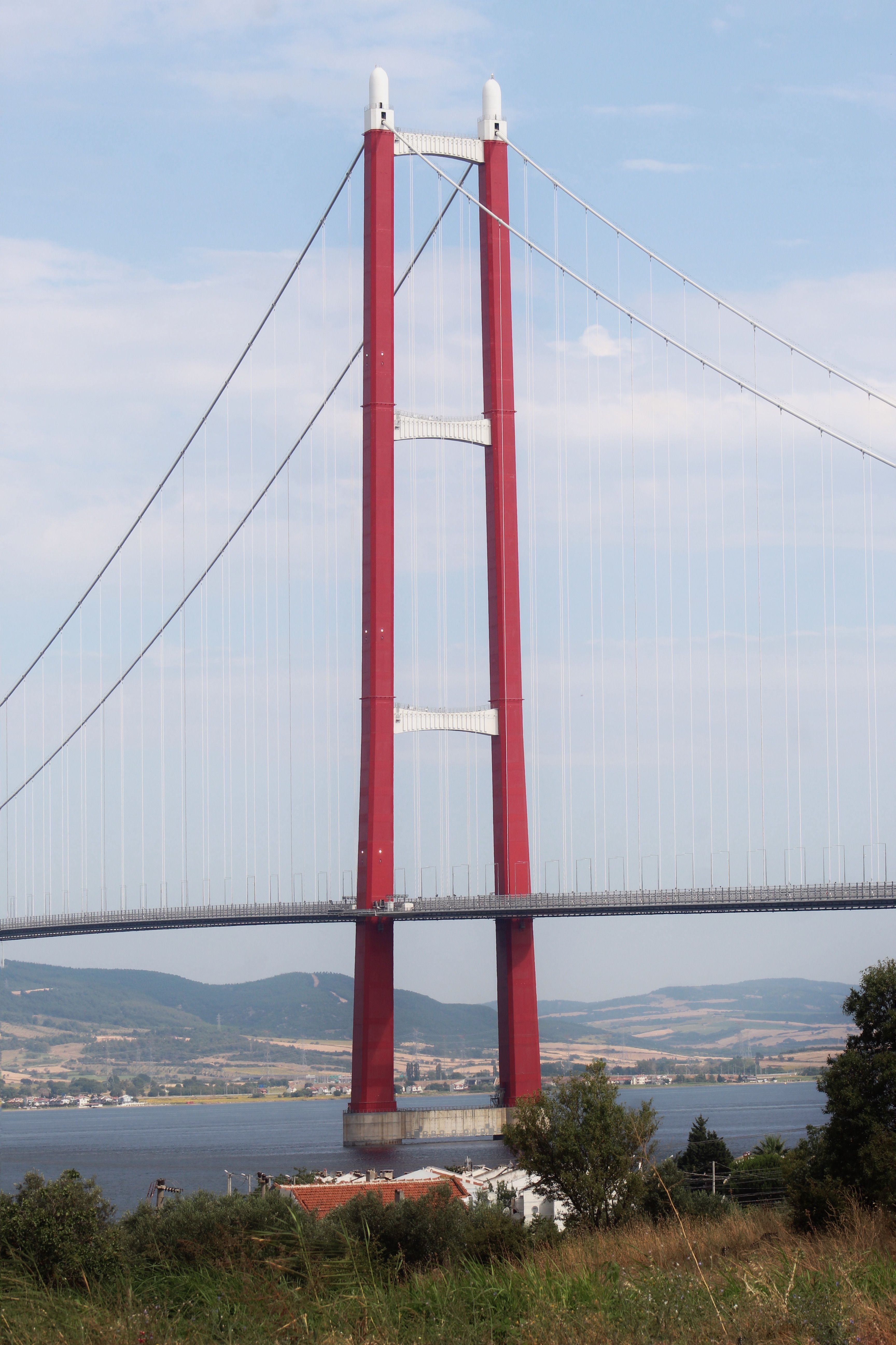 A large red bridge with a red and white bridge · Free Stock Photo