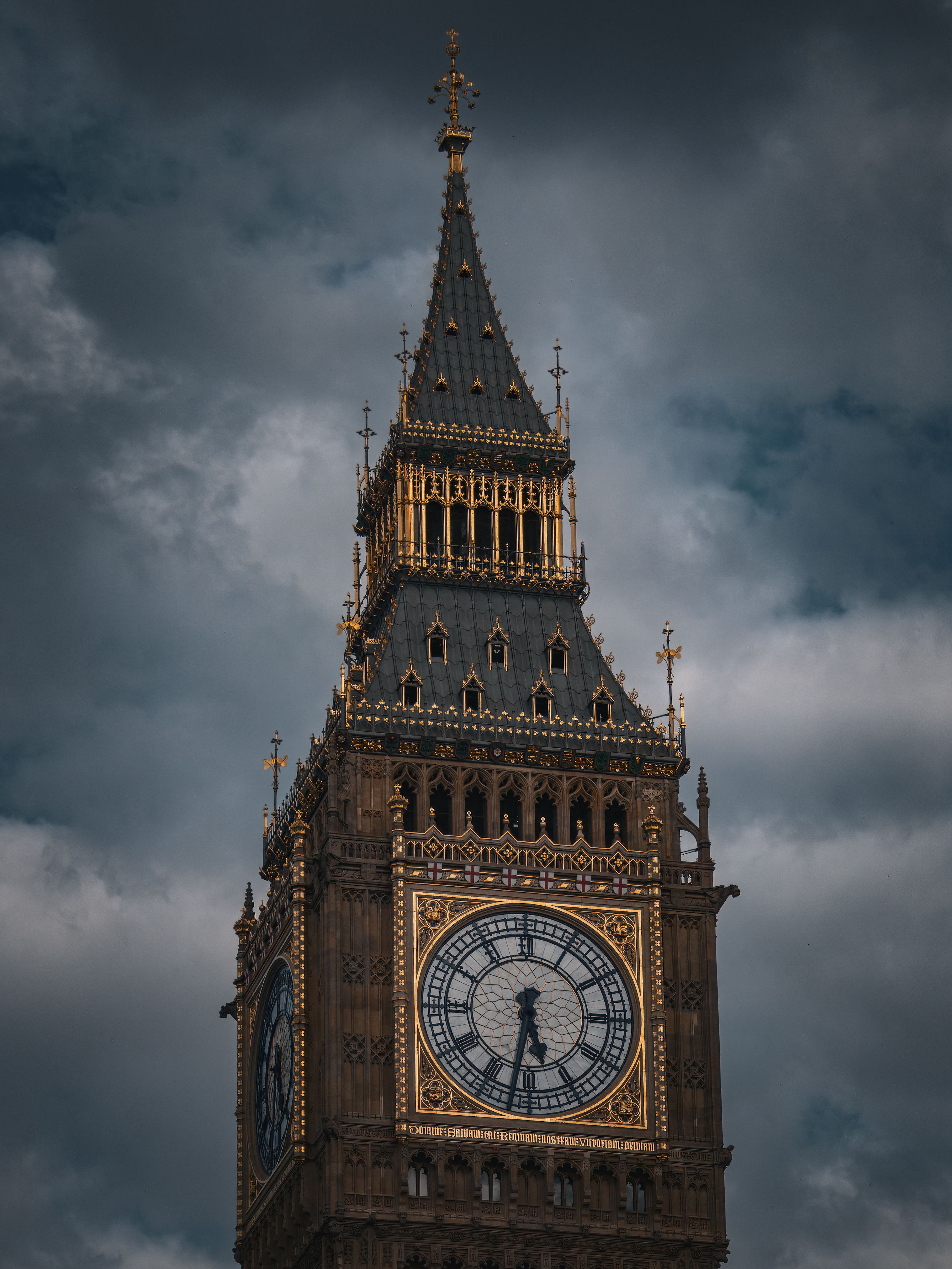 Low Angle View of Clock Tower Against Blue Sky · Free Stock Photo