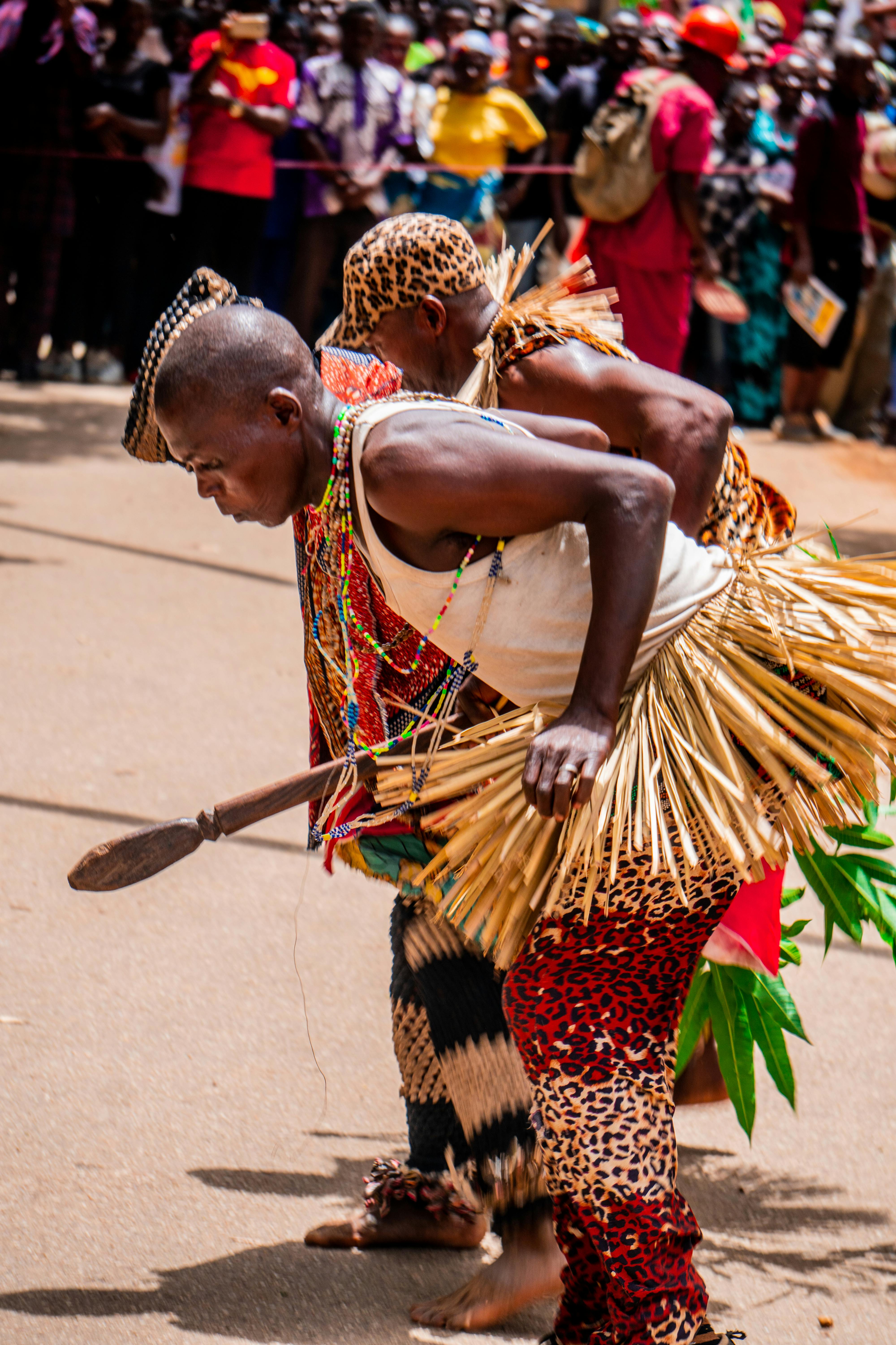 Woman Wearing Yellow And Red Traditional Dress Dancing Near Building ...