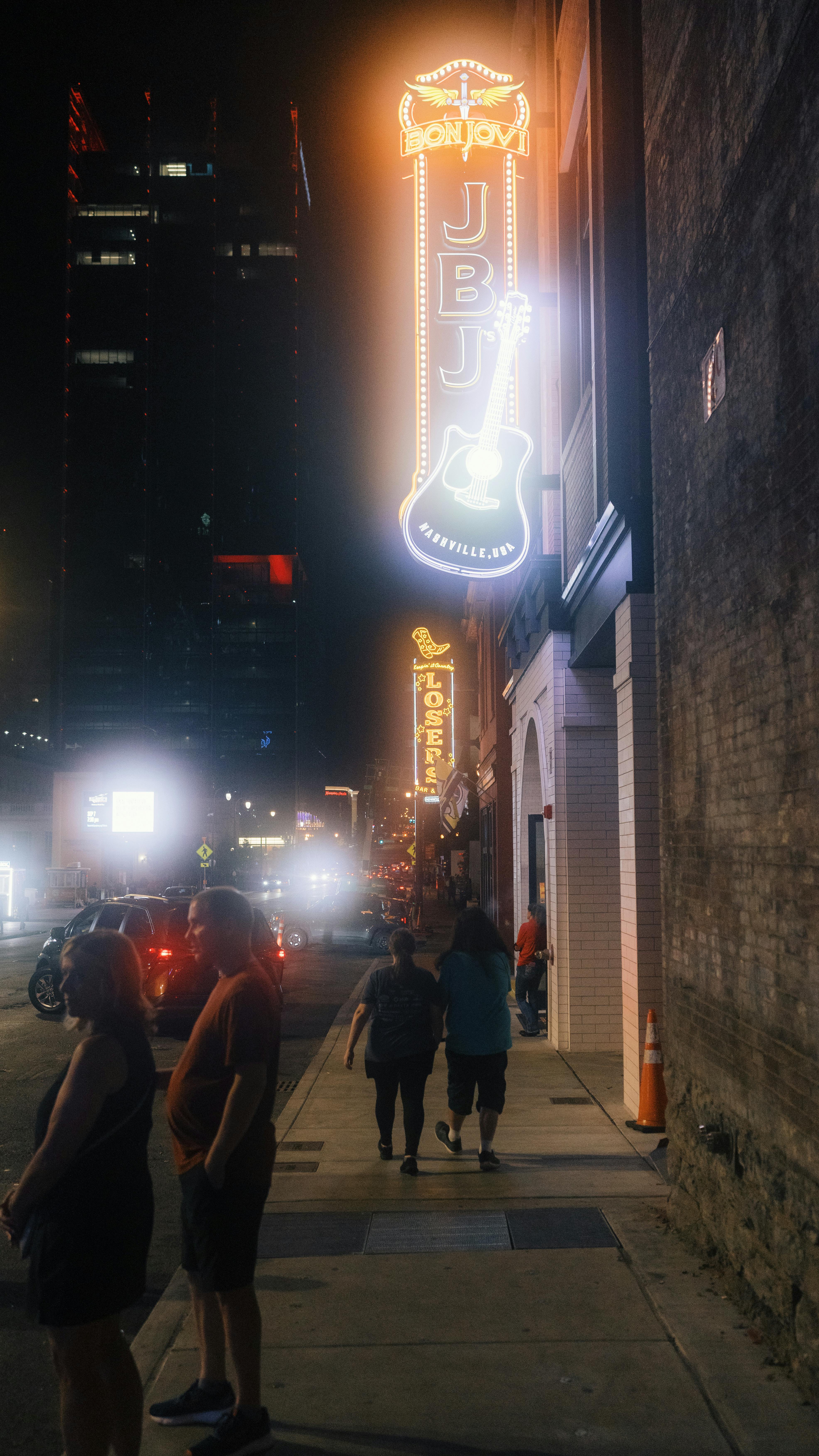 Neon Light Signages On Wall · Free Stock Photo