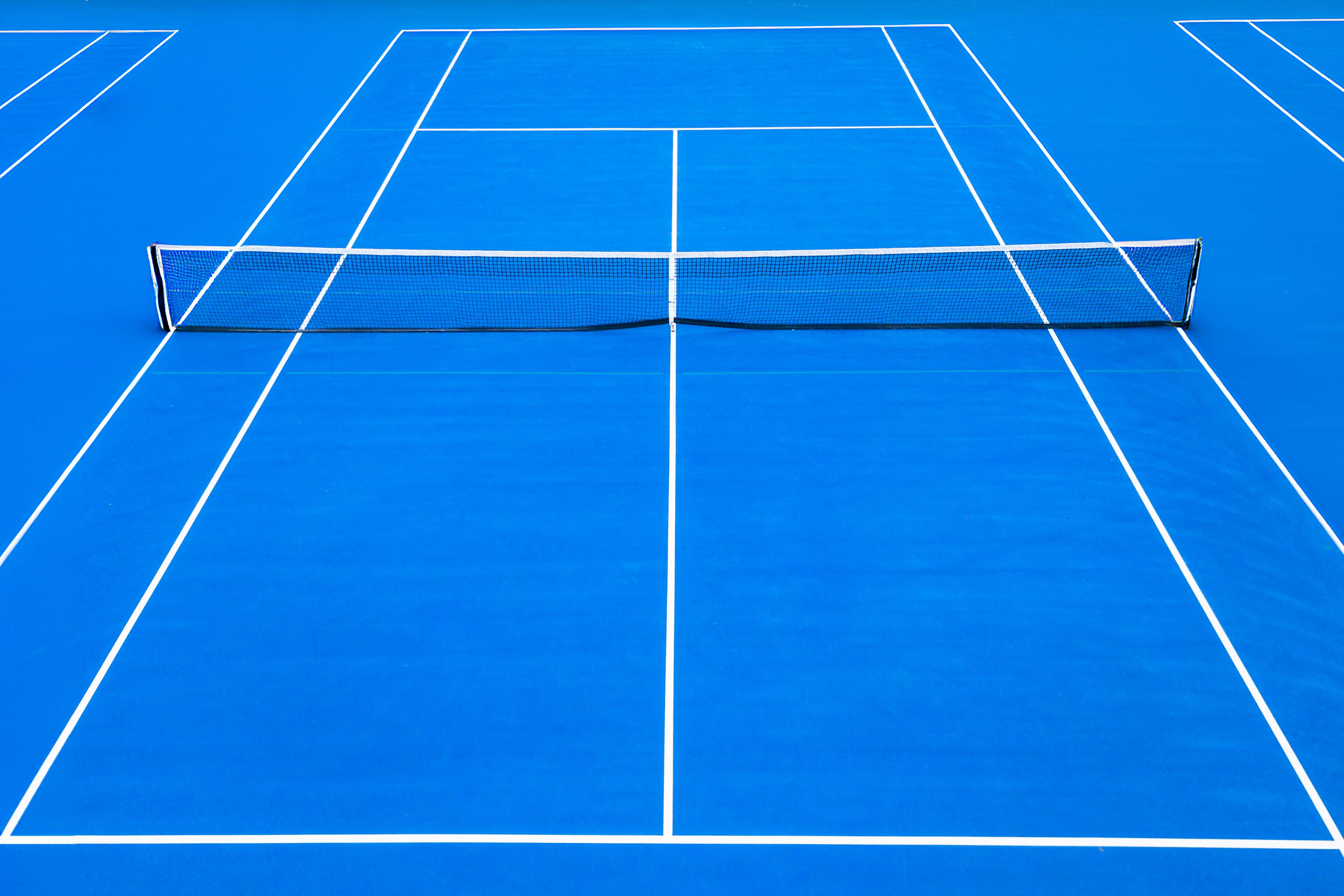 Tennis court with blue surface · Free Stock Photo