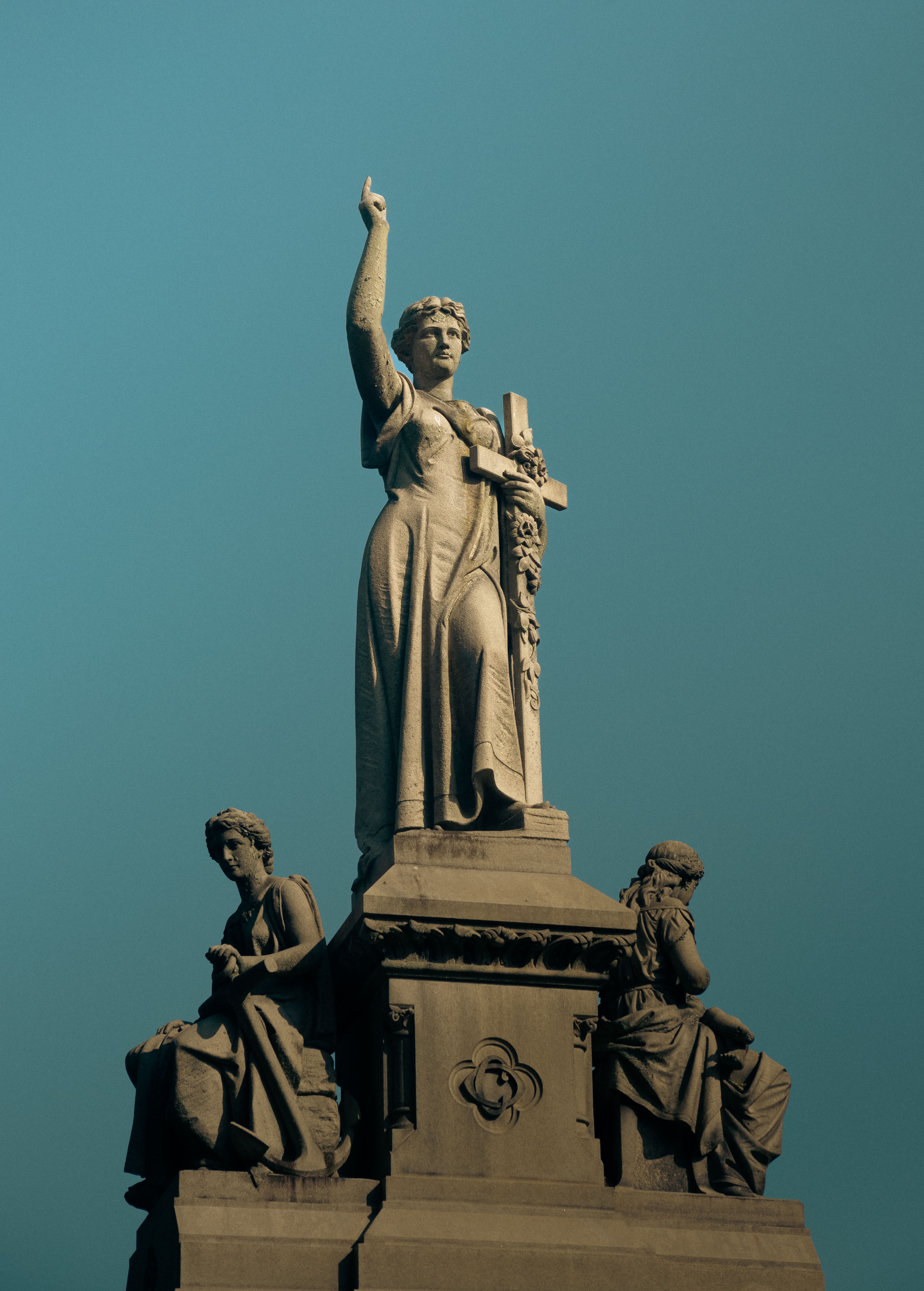 A statue of liberty with a woman holding a torch · Free Stock Photo