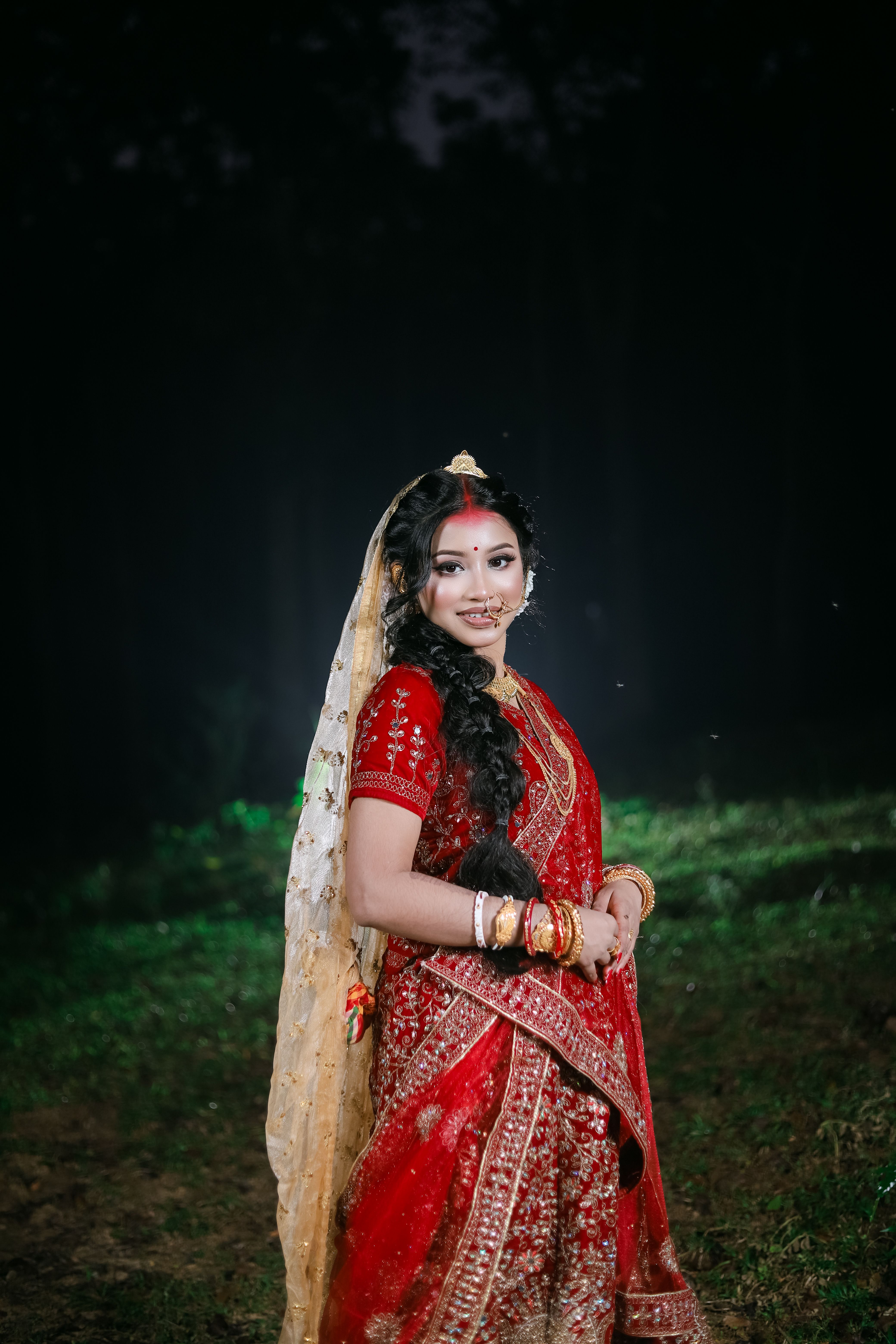 A beautiful indian bride in red and gold · Free Stock Photo