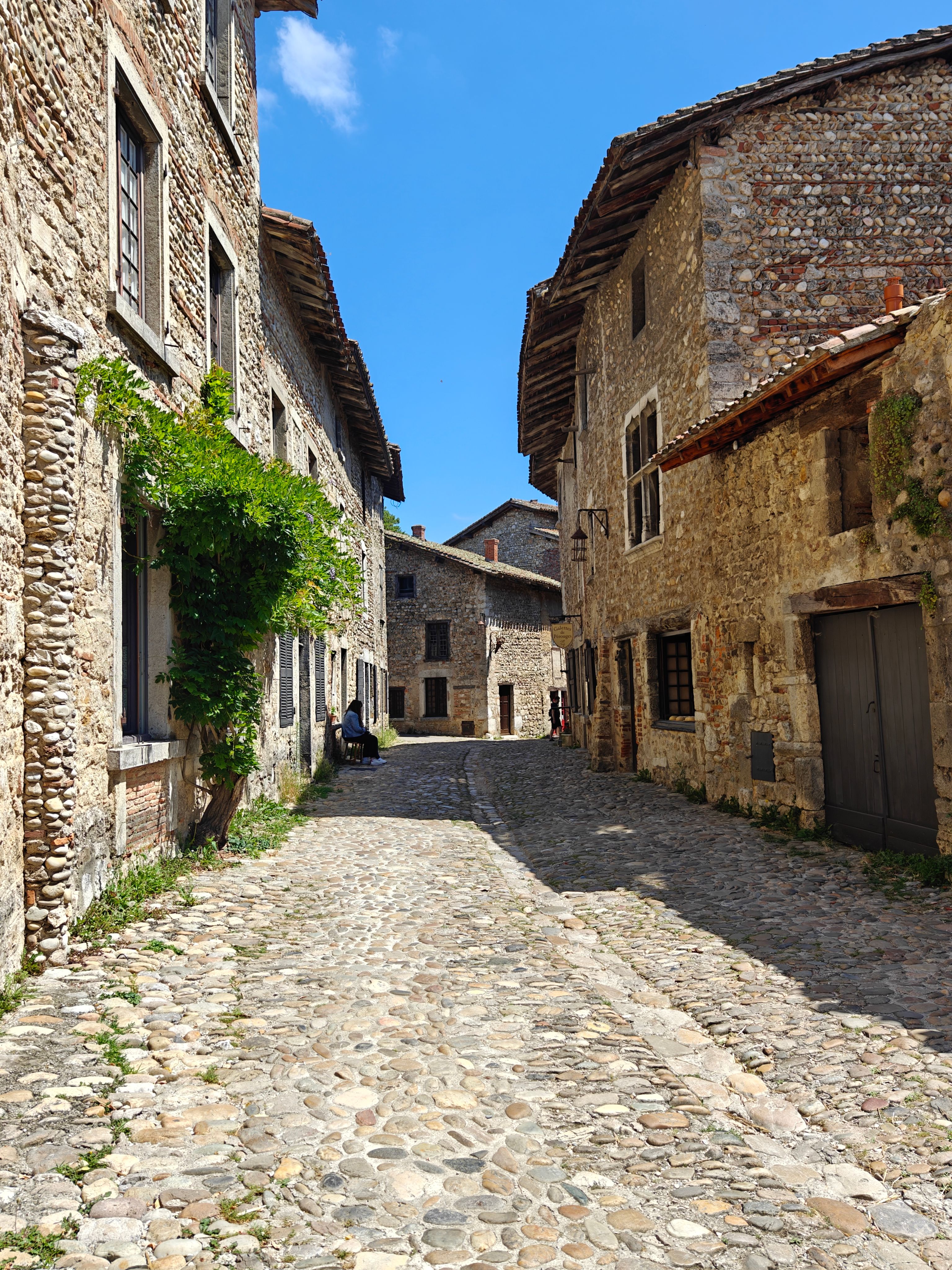 A cobblestone street in an old town · Free Stock Photo
