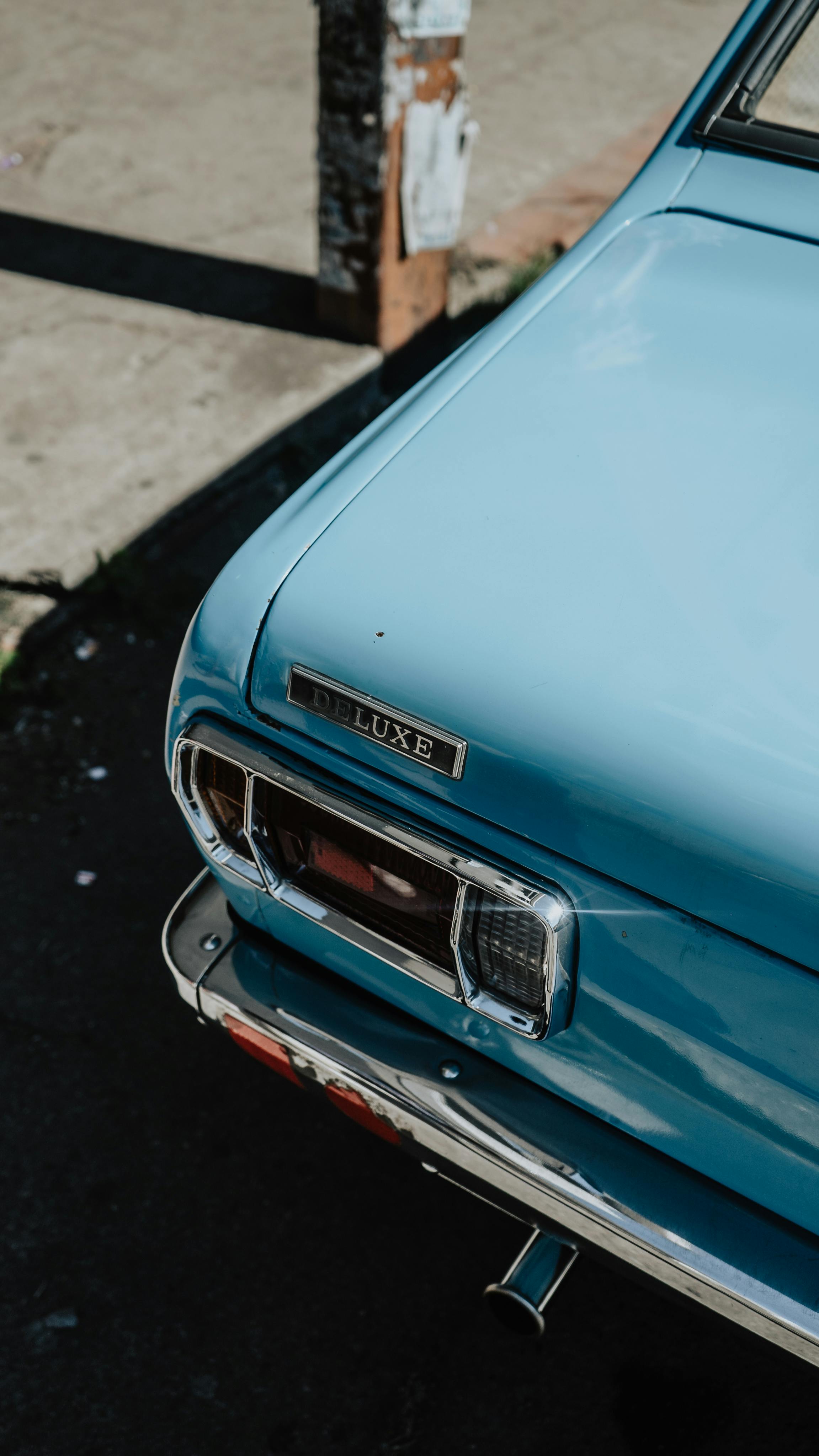 Close-up of the Back of a Vintage Datsun Deluxe · Free Stock Photo