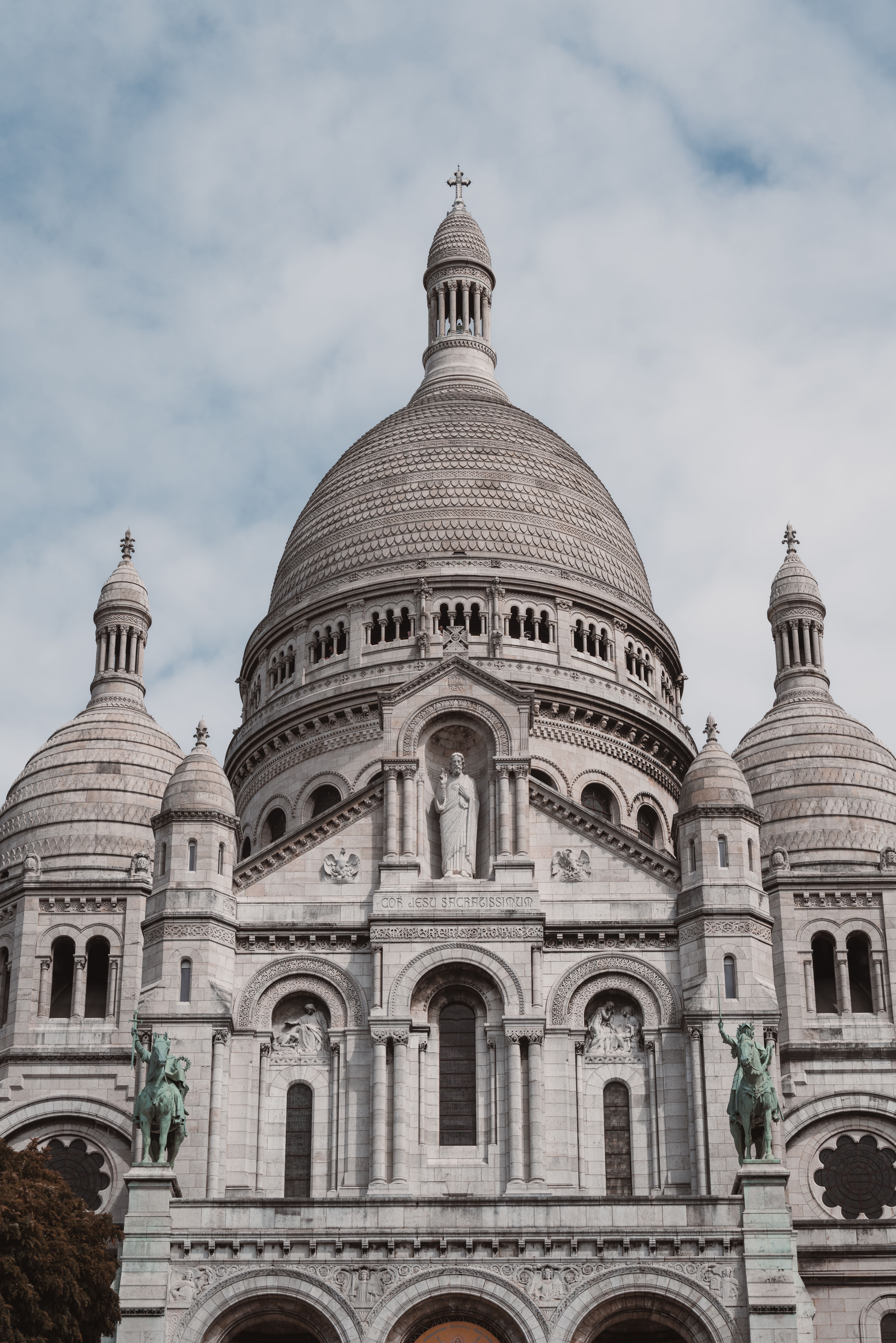 Aged domed Catholic cathedral made of travertine · Free Stock Photo