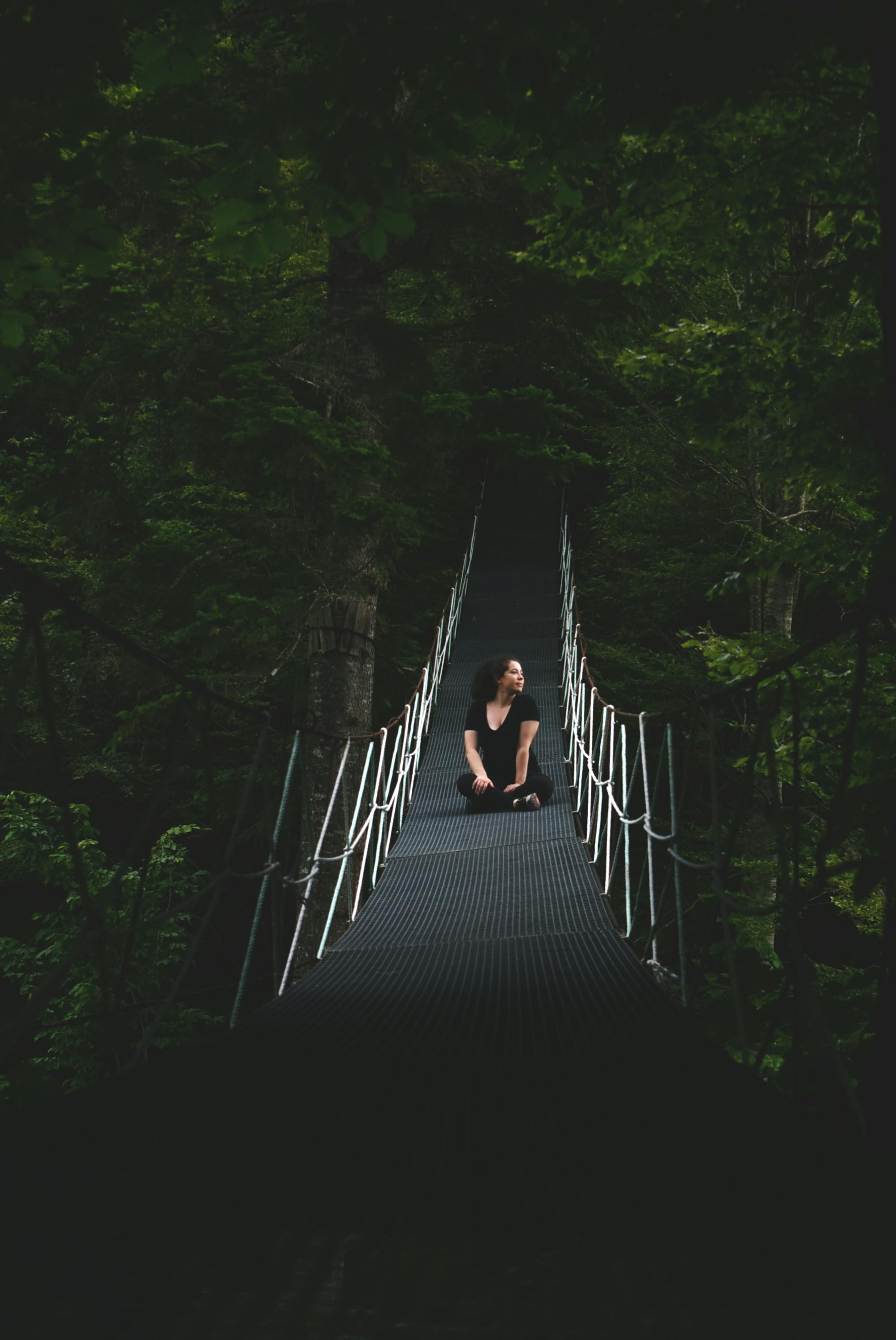 Woman Sitting On Bridge · Free Stock Photo