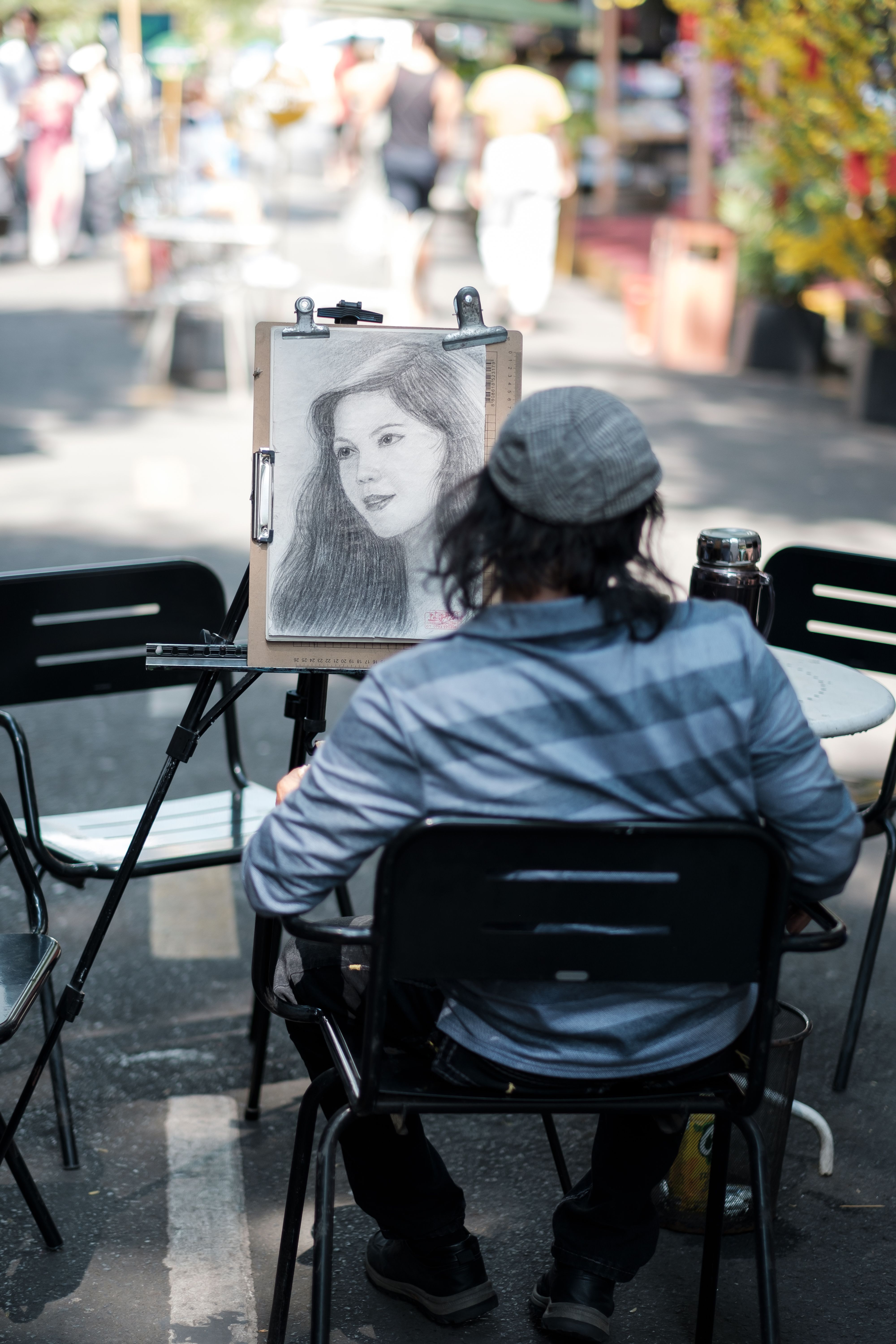Photo of Man Drawing a Portrait of a Woman · Free Stock Photo
