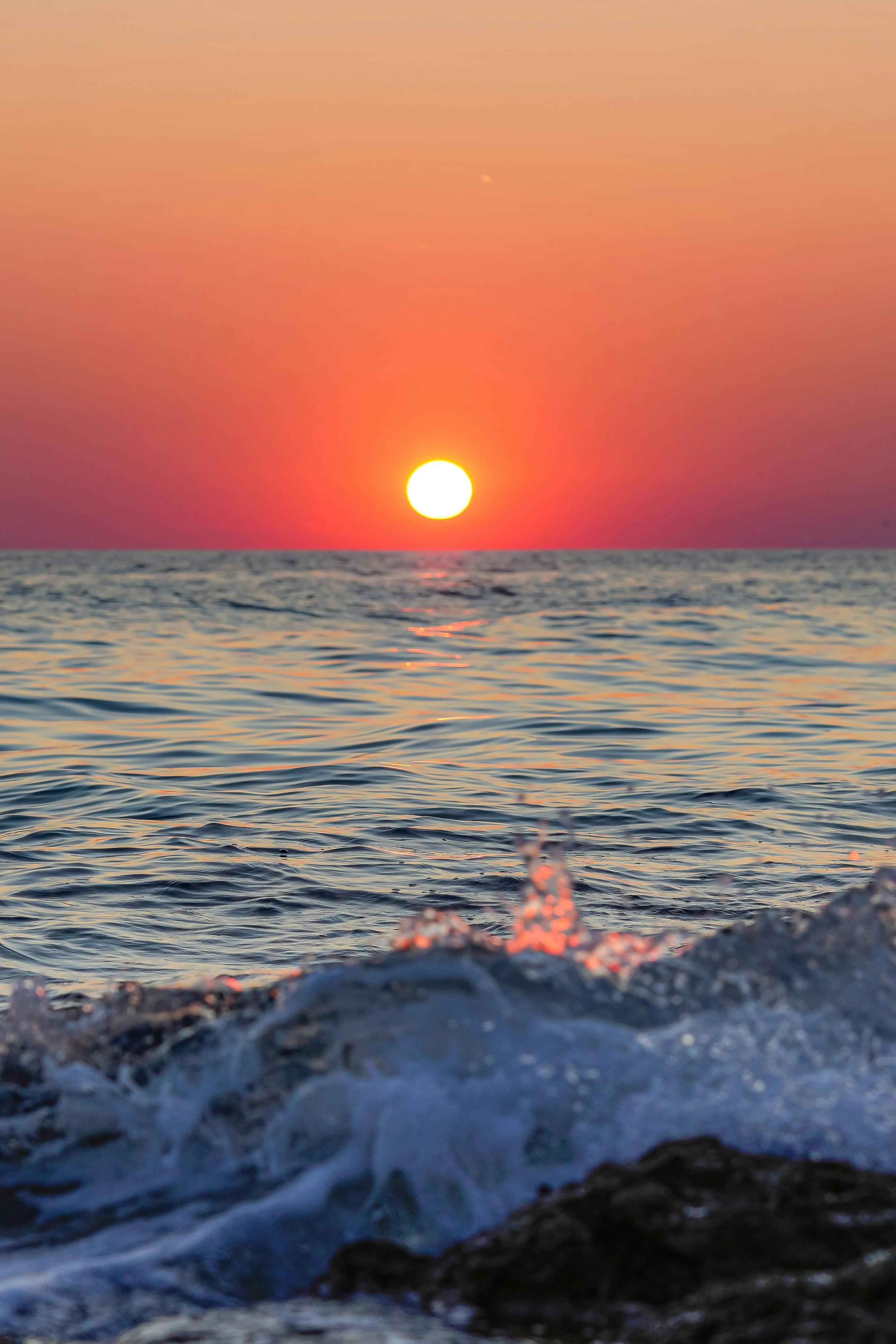 Sunset over the sea by jonathan kennedy · Free Stock Photo