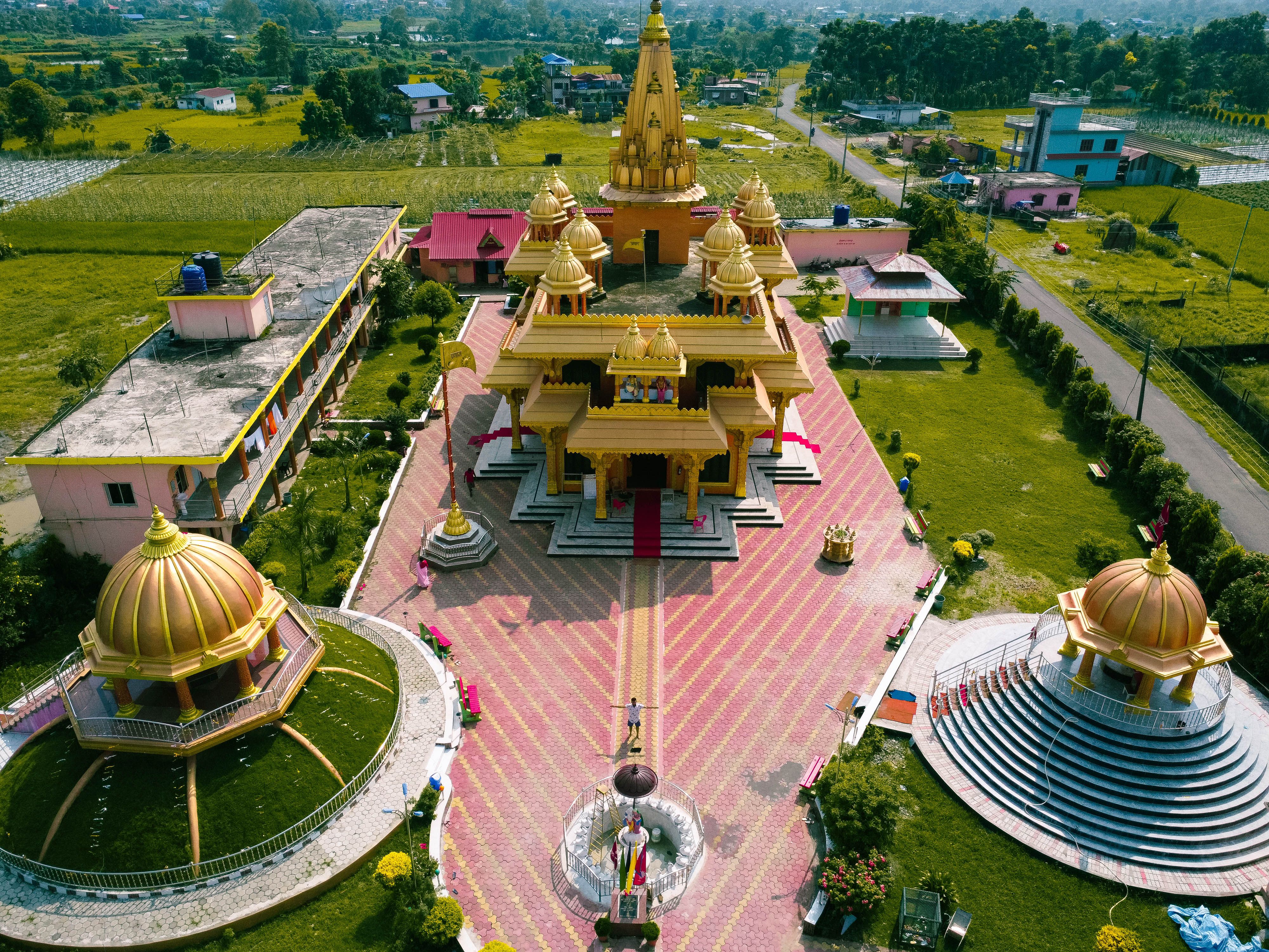 An aerial view of a temple with a large dome · Free Stock Photo