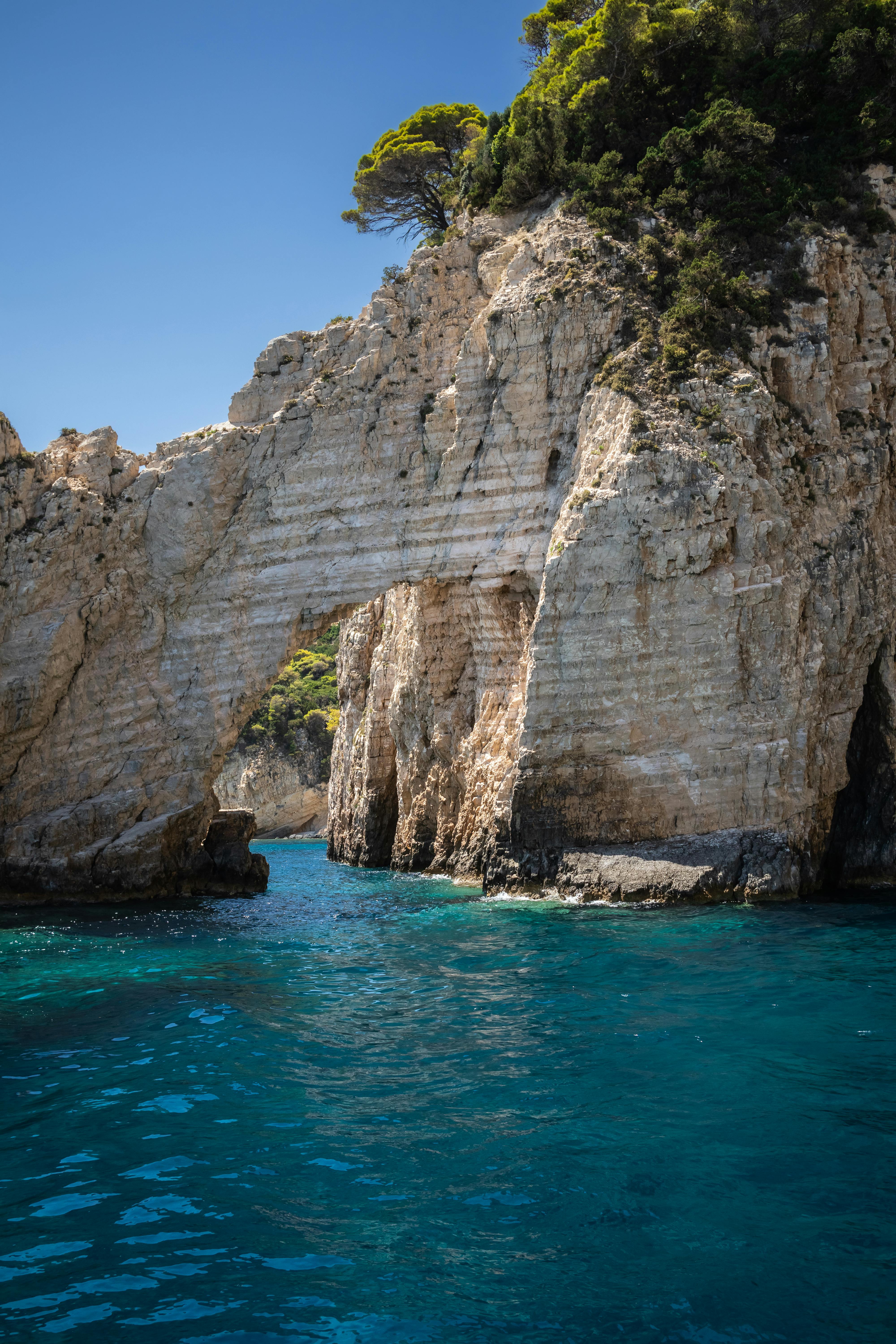 Keri Cave Arch Rock with Turquoise Ionian Sea · Free Stock Photo