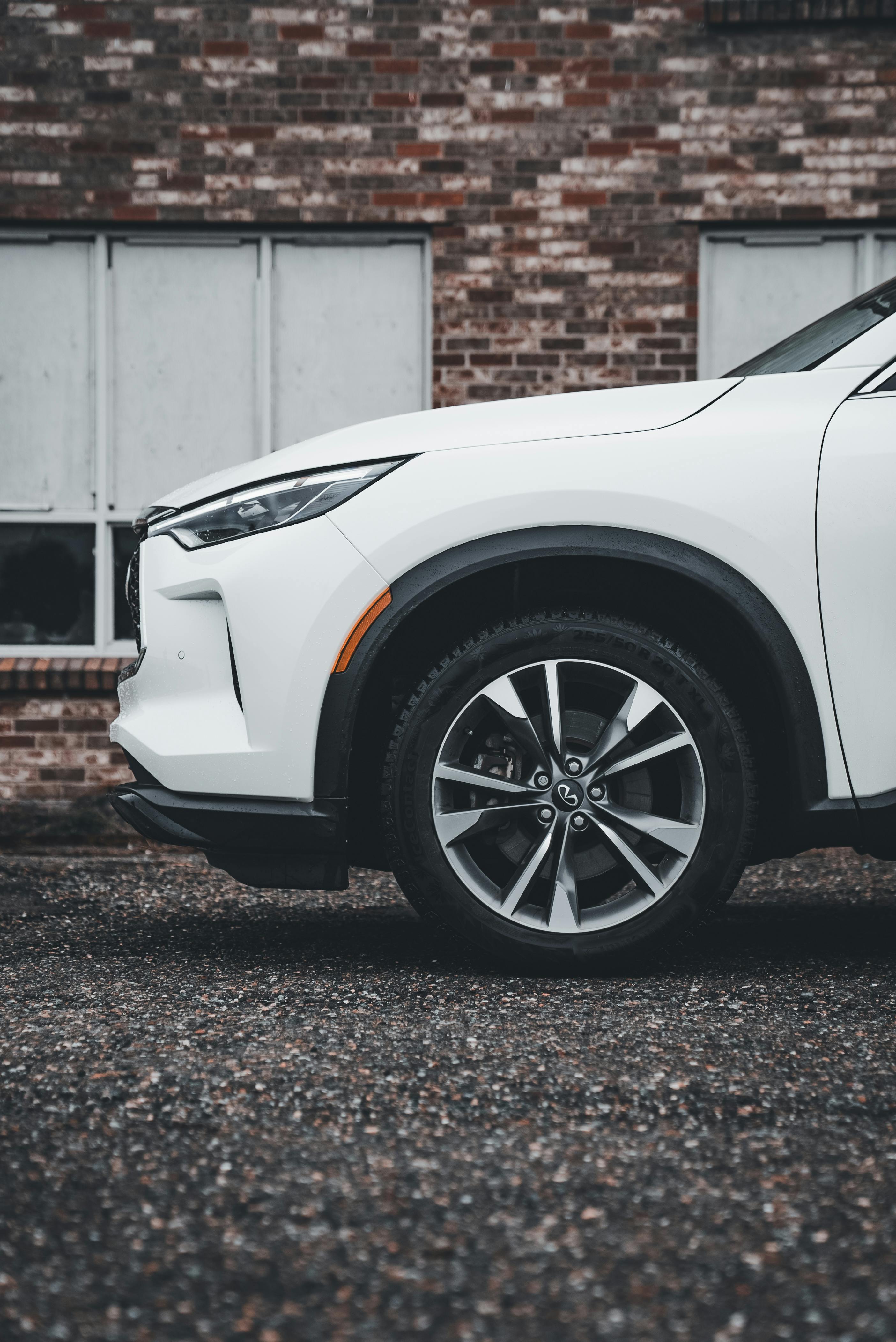 The front end of a white 2020 hyundai suv · Free Stock Photo