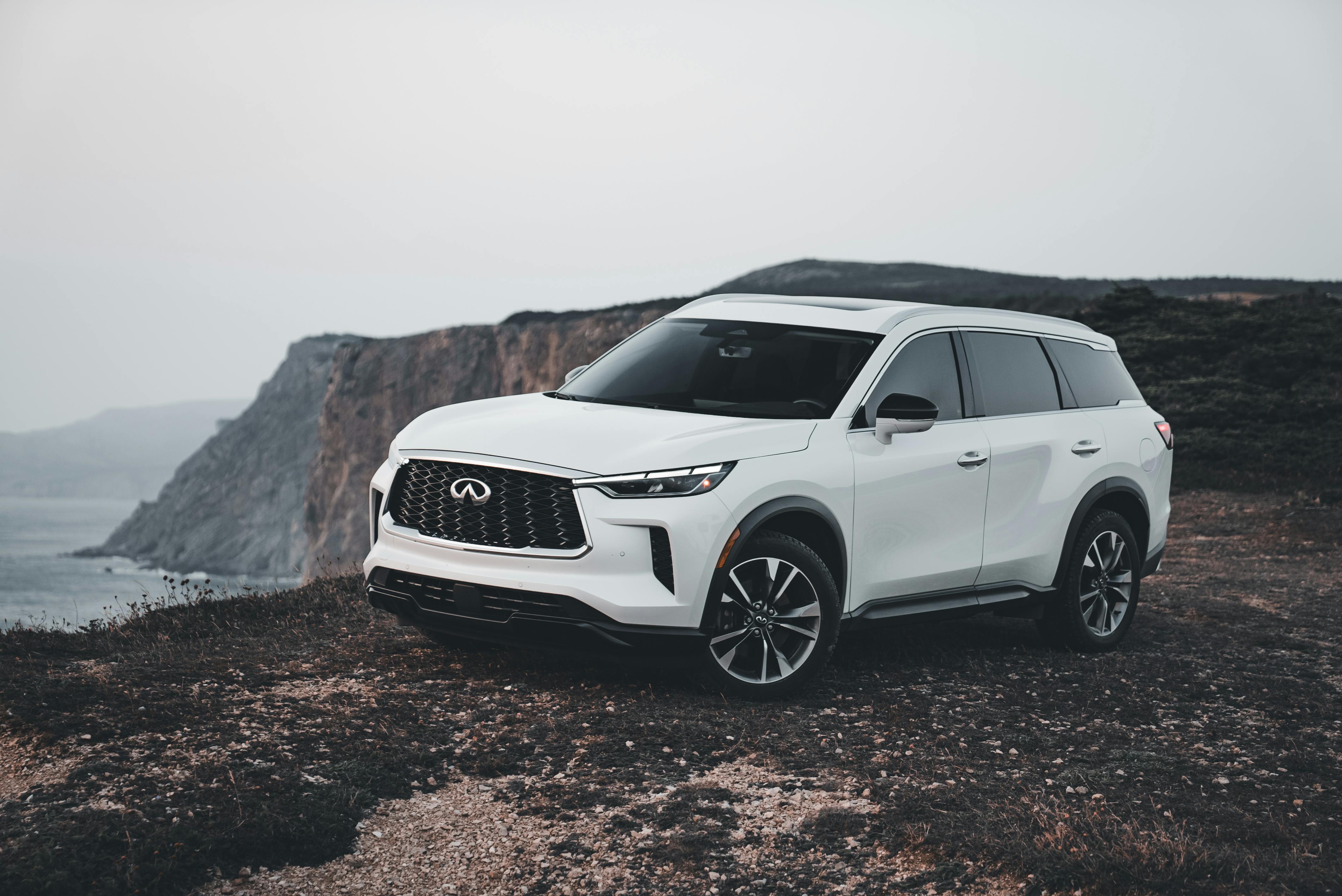 The 2020 infiniti suv parked on a cliff overlooking the ocean · Free ...