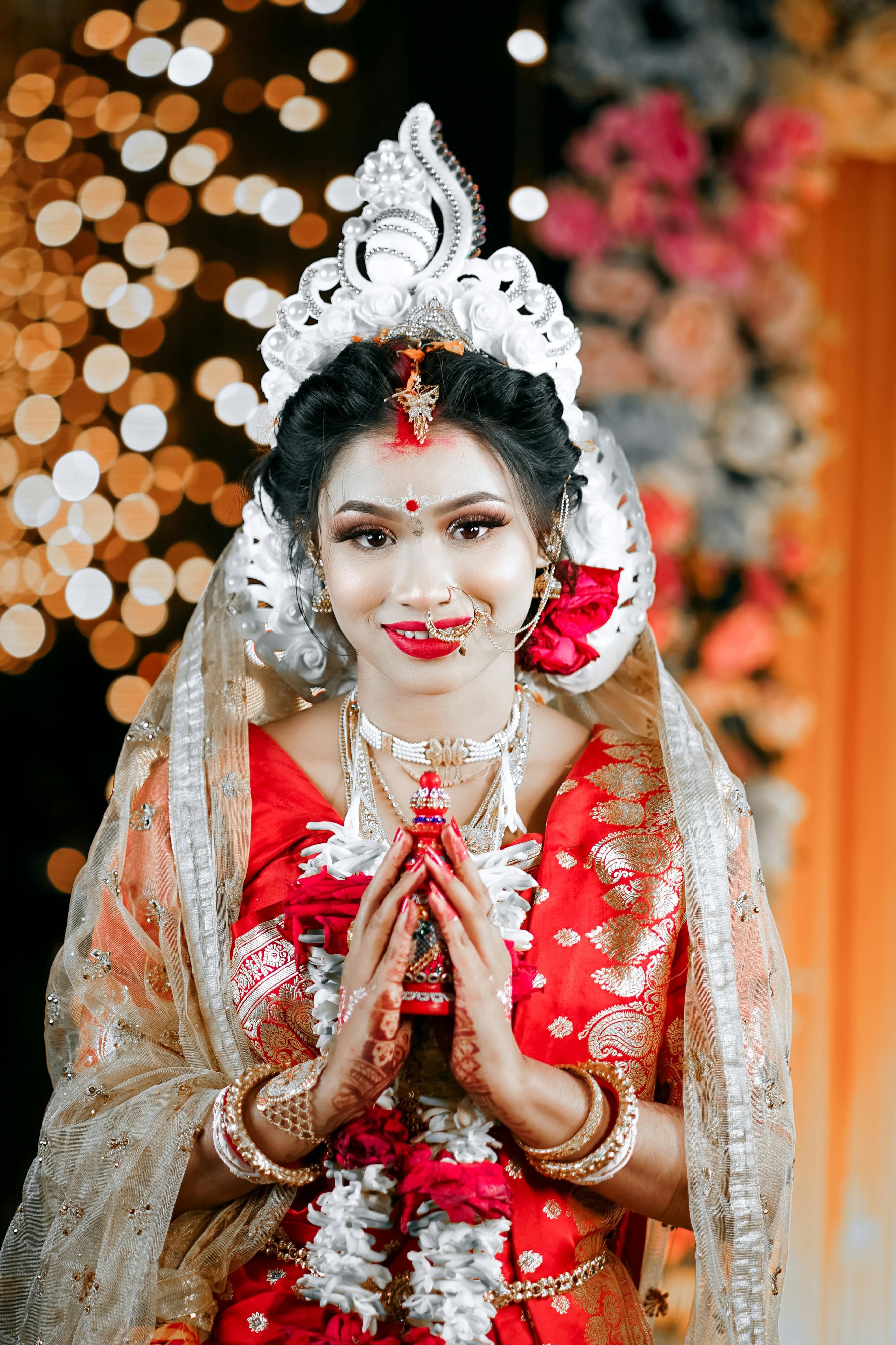 A beautiful indian bride in traditional attire · Free Stock Photo