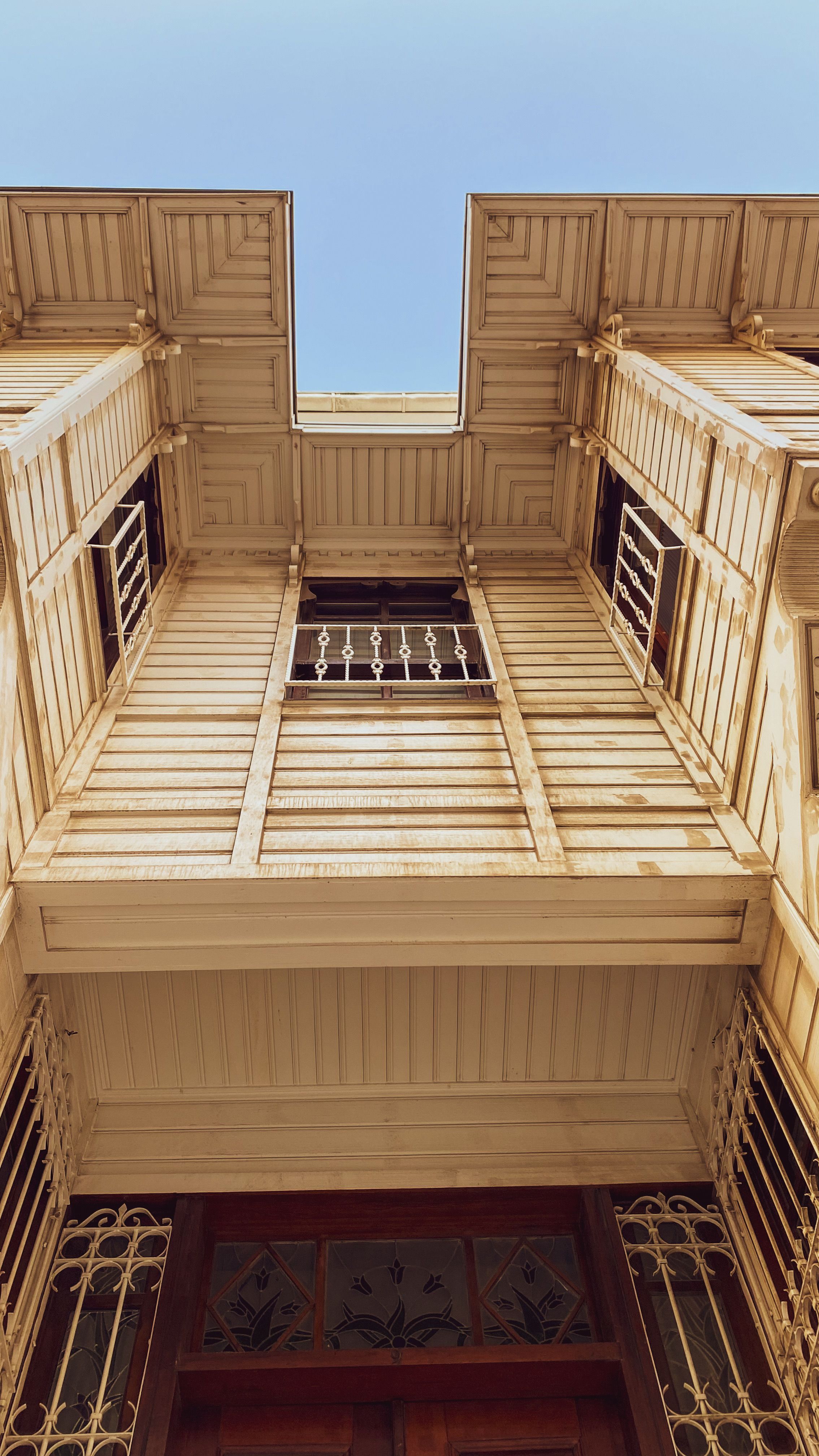 The view from the top of a building with a window · Free Stock Photo